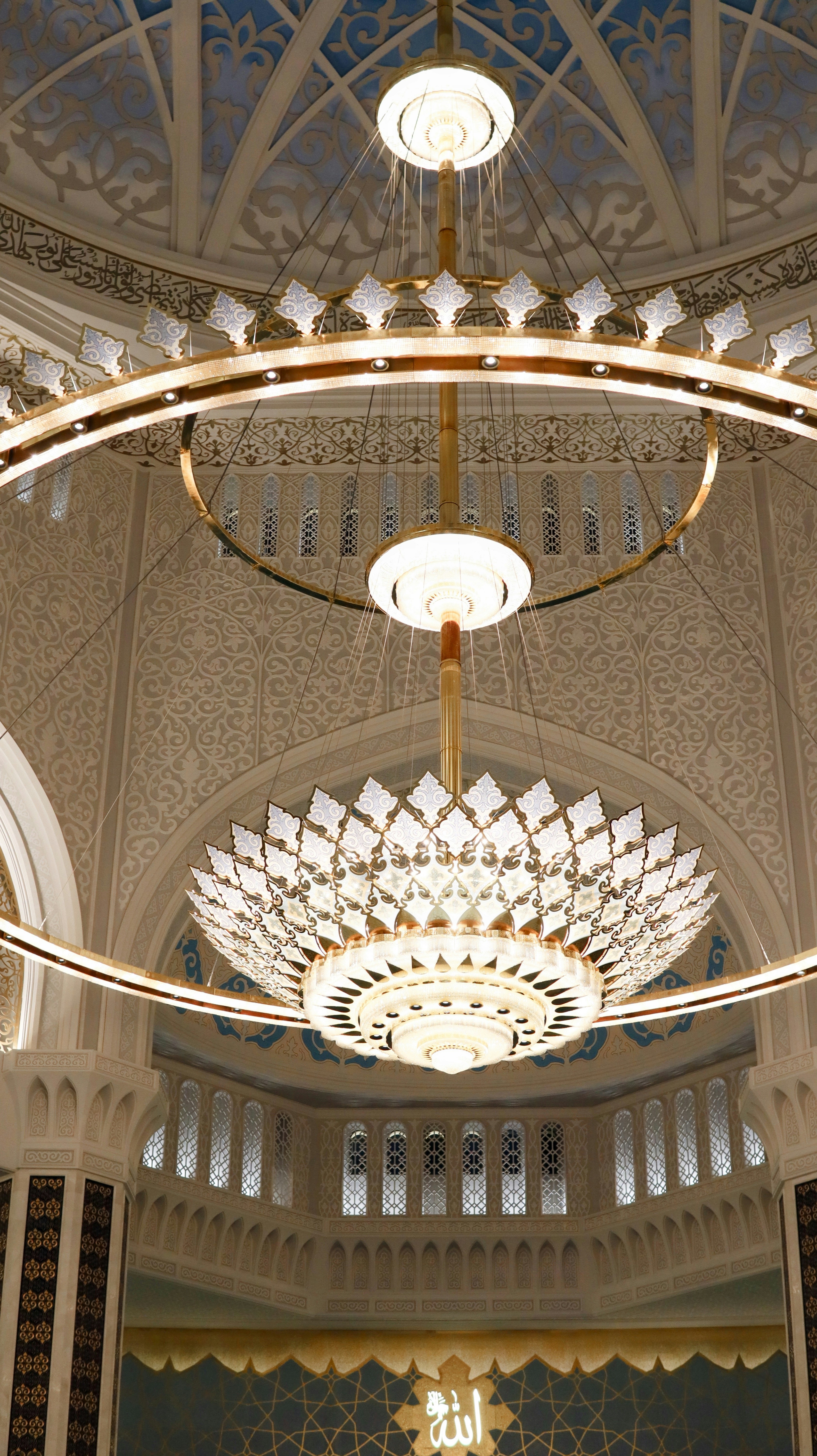Circulating Radiance: A Grand Chandelier Illuminates a Moorish Hall
