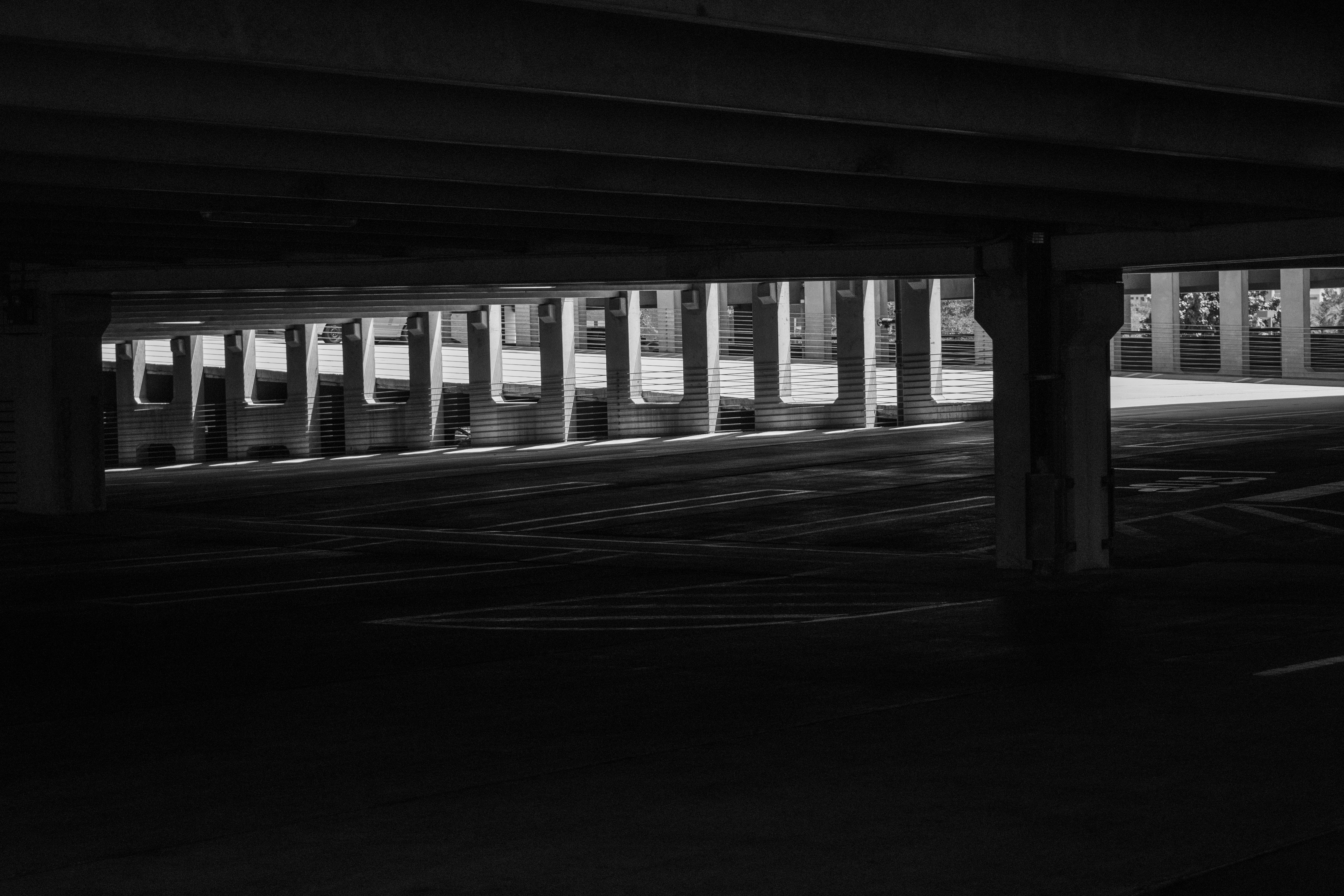 Under a dark structure, light shines through. photo – Free Image on ...