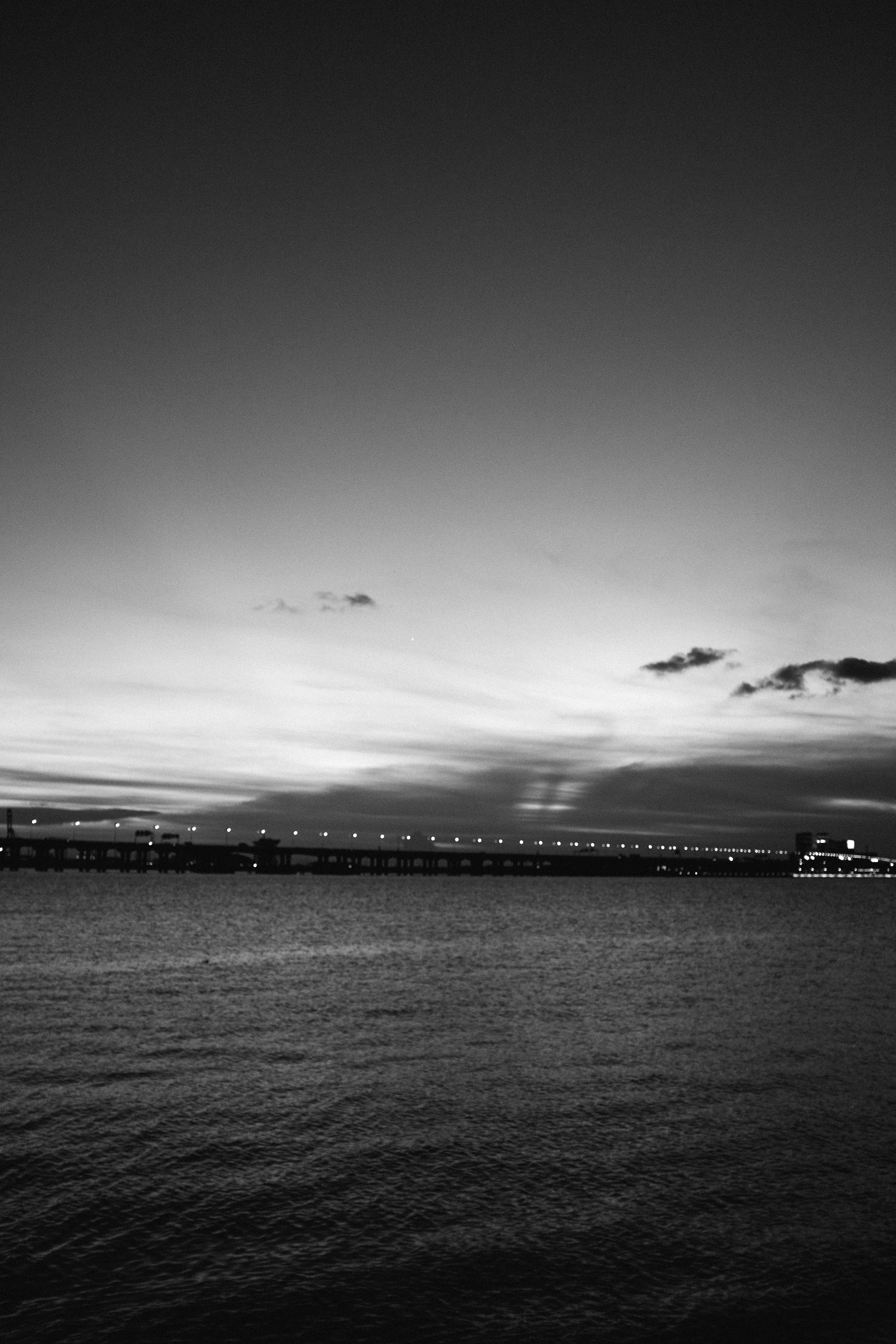 Horizon of Lights: A Quiet Mono Pier at Dusk