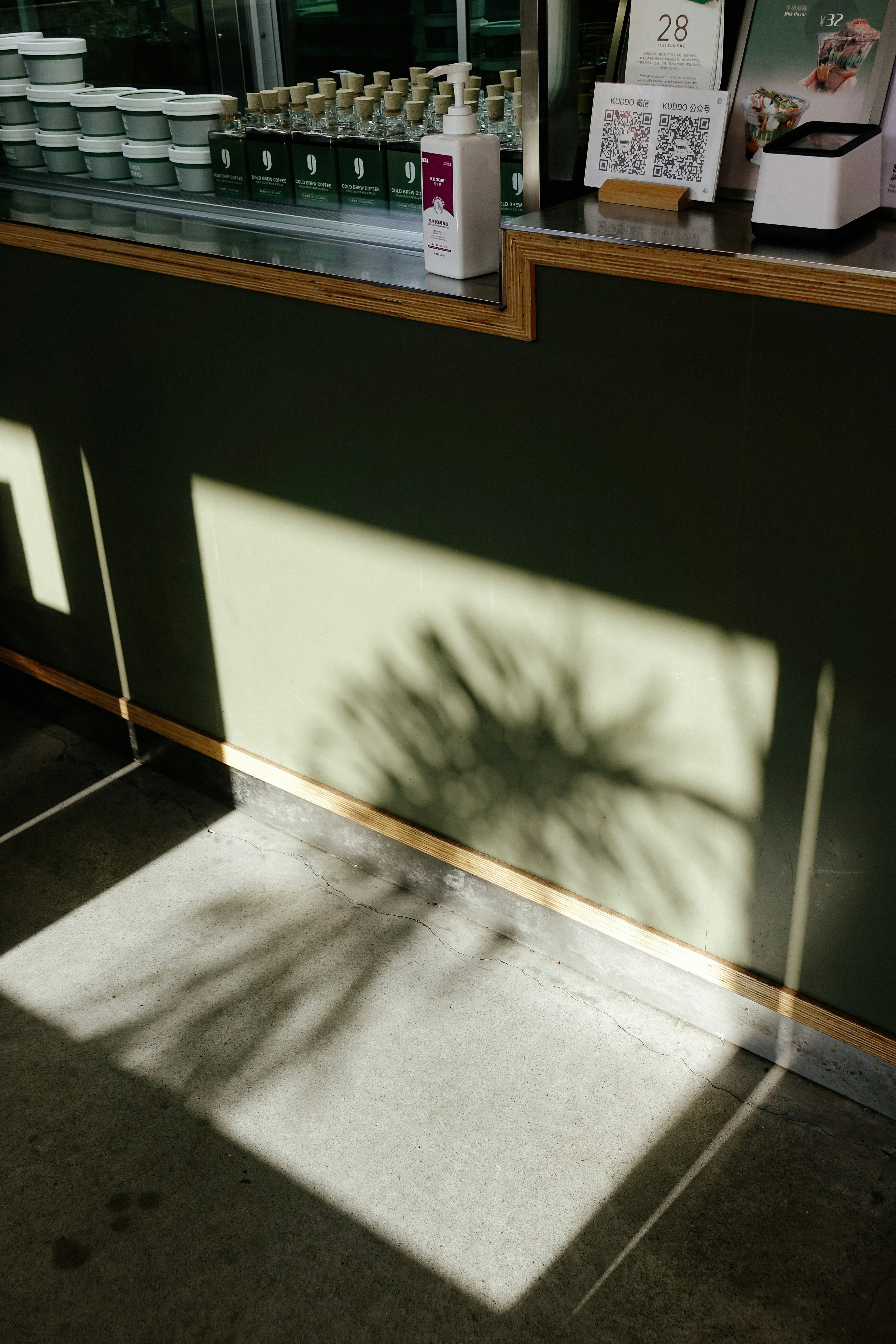 Sunlight casts shadows inside a modern cafe. photo – Free Coffeeshop ...