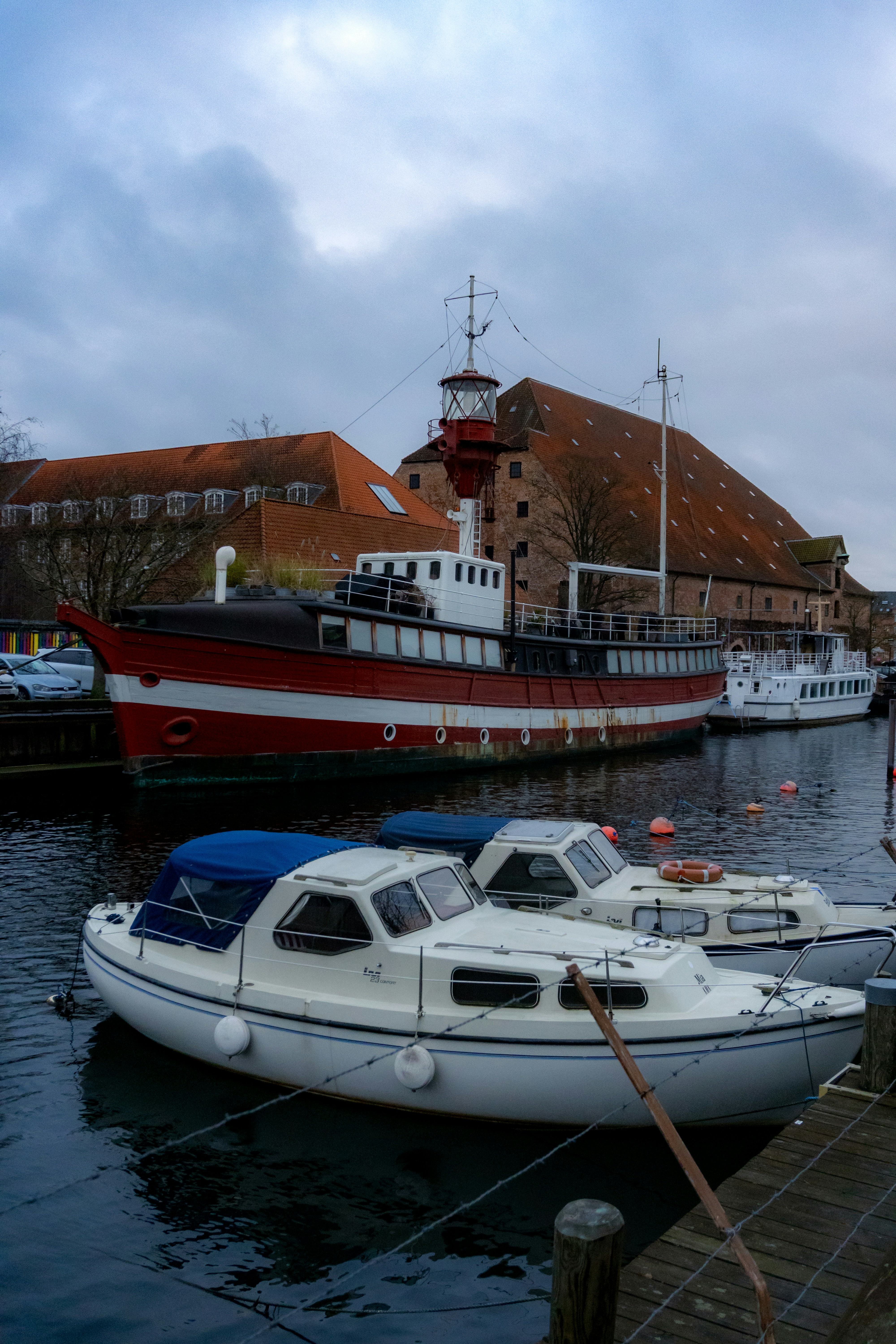 Red-Hull at the Brick Harbor: Moody Docks and Quiet Waters