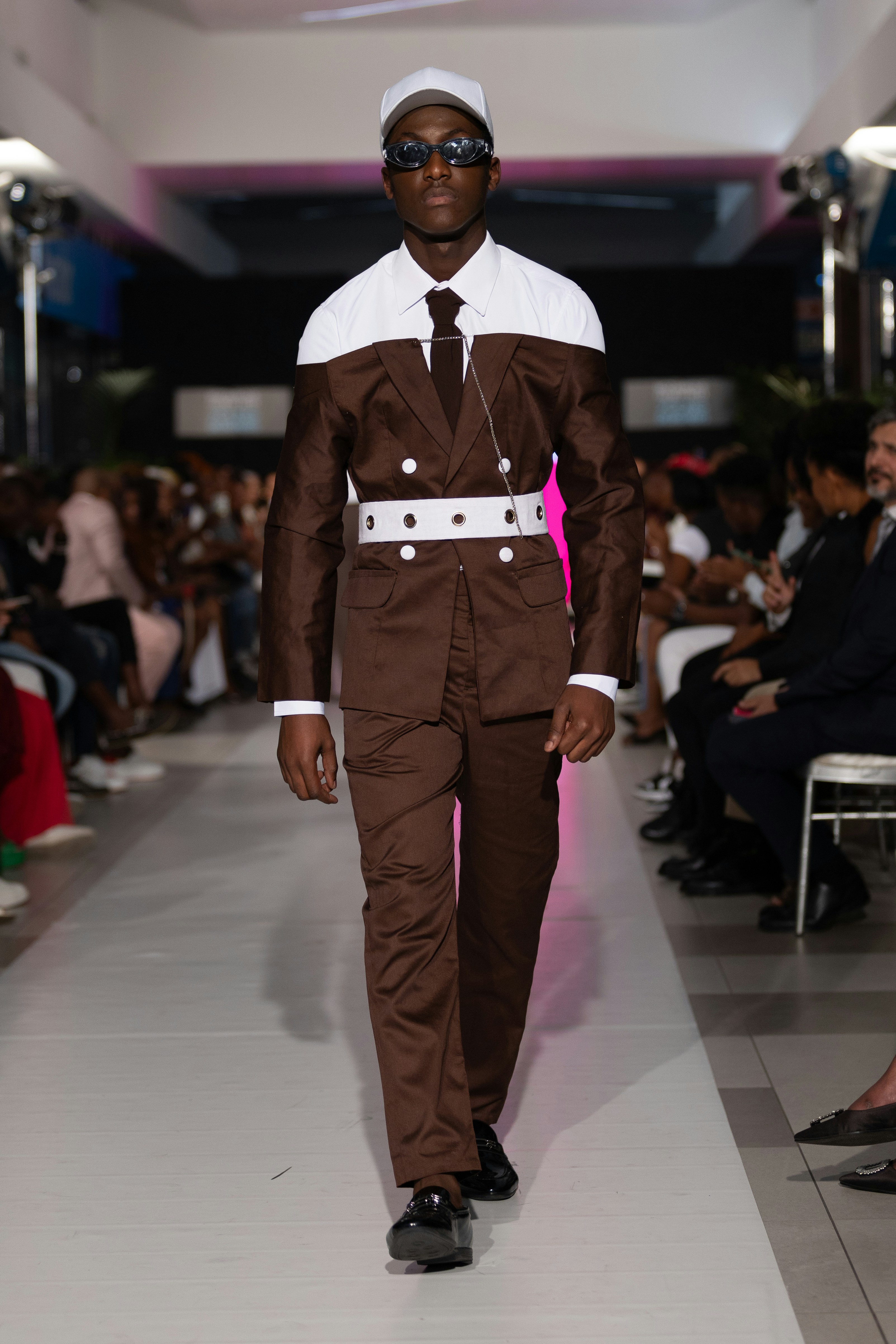 Brown and White Couture Struts Down the Runway