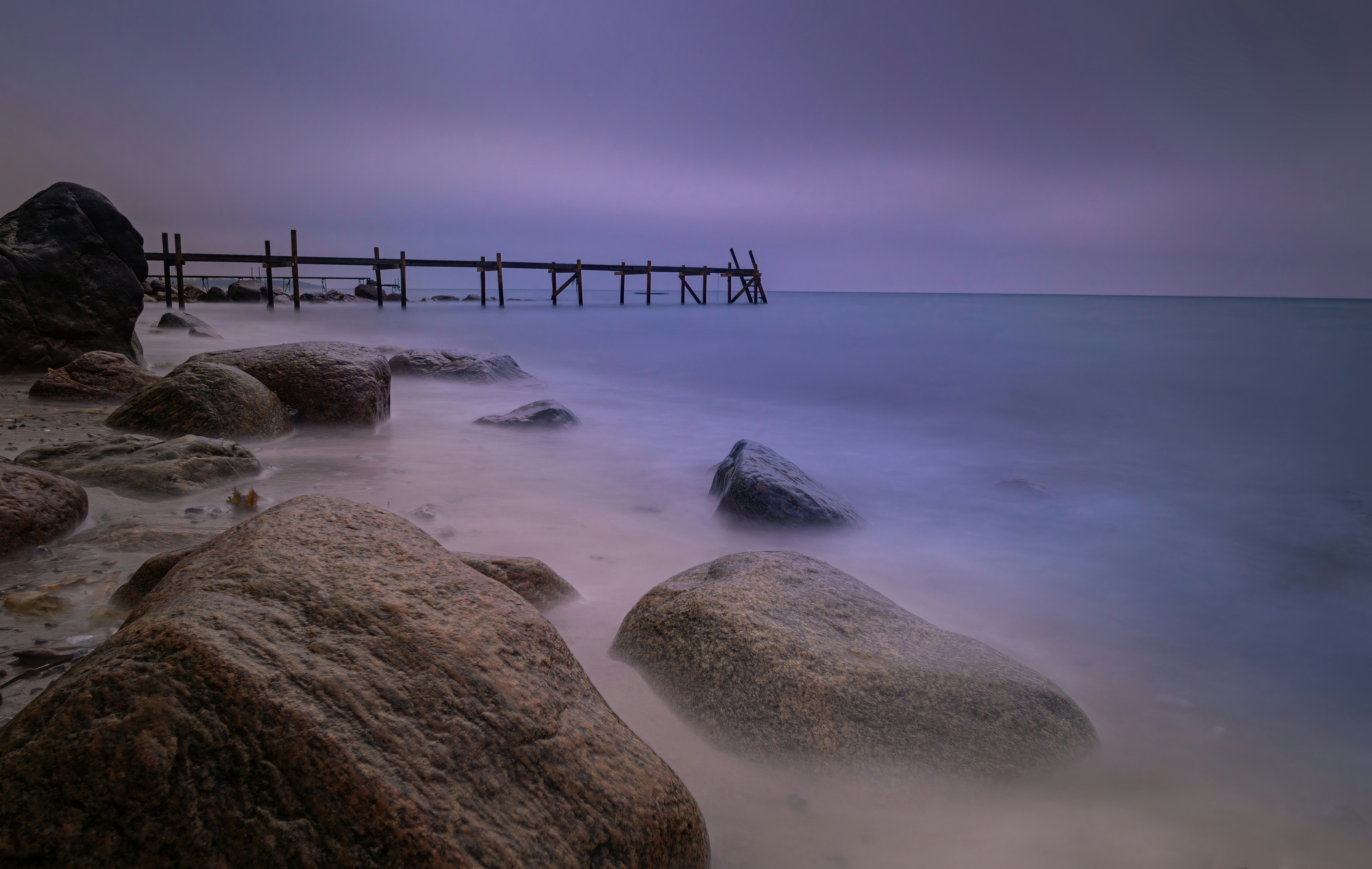 Whispering Ledge: A Dusk Pier Reaches Into Velvet Seas