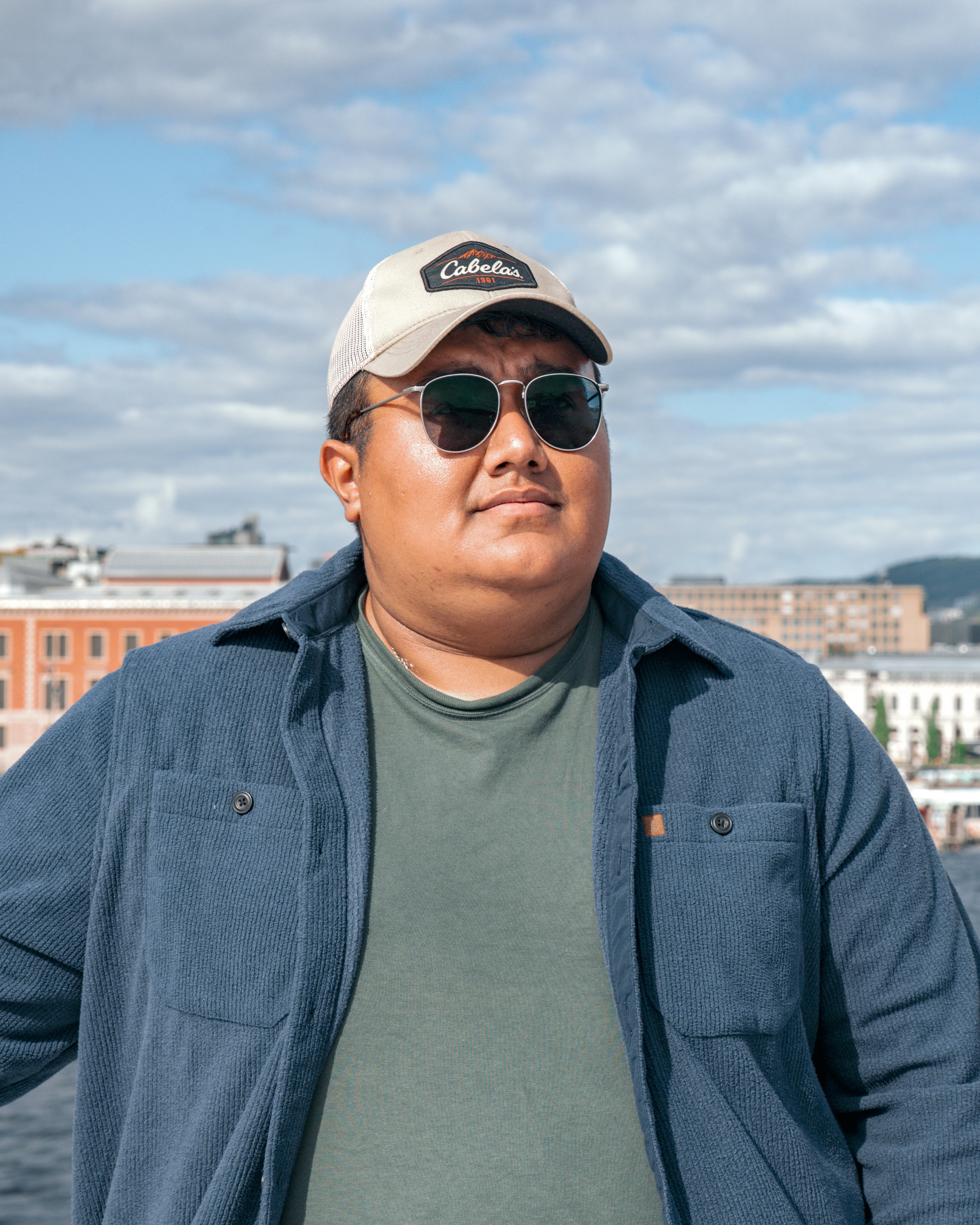 A man wearing sunglasses looks away from the camera. photo – Free ...