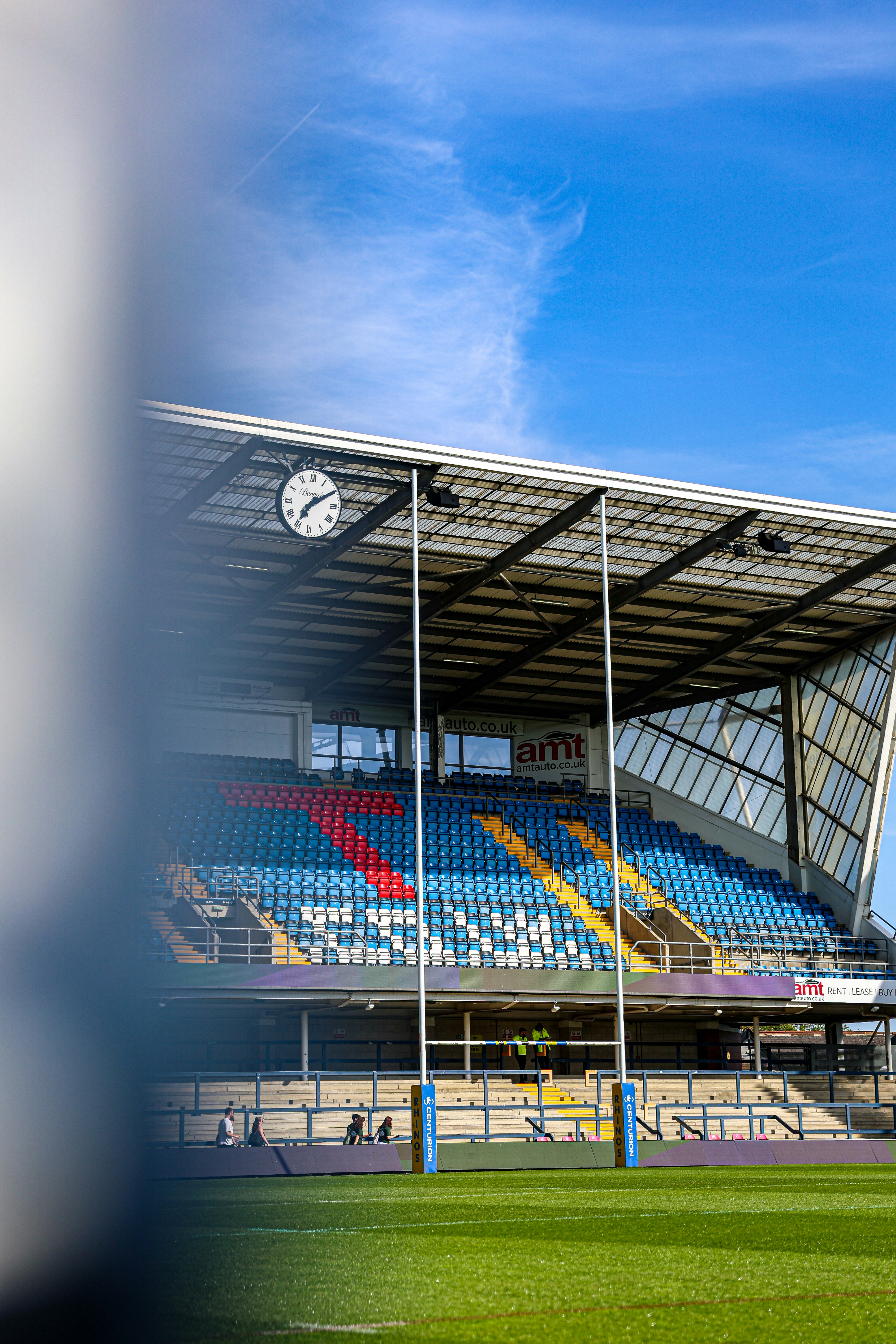 Symmetry in the Stands: A Quiet Moment at a Rugby/Football Ground
