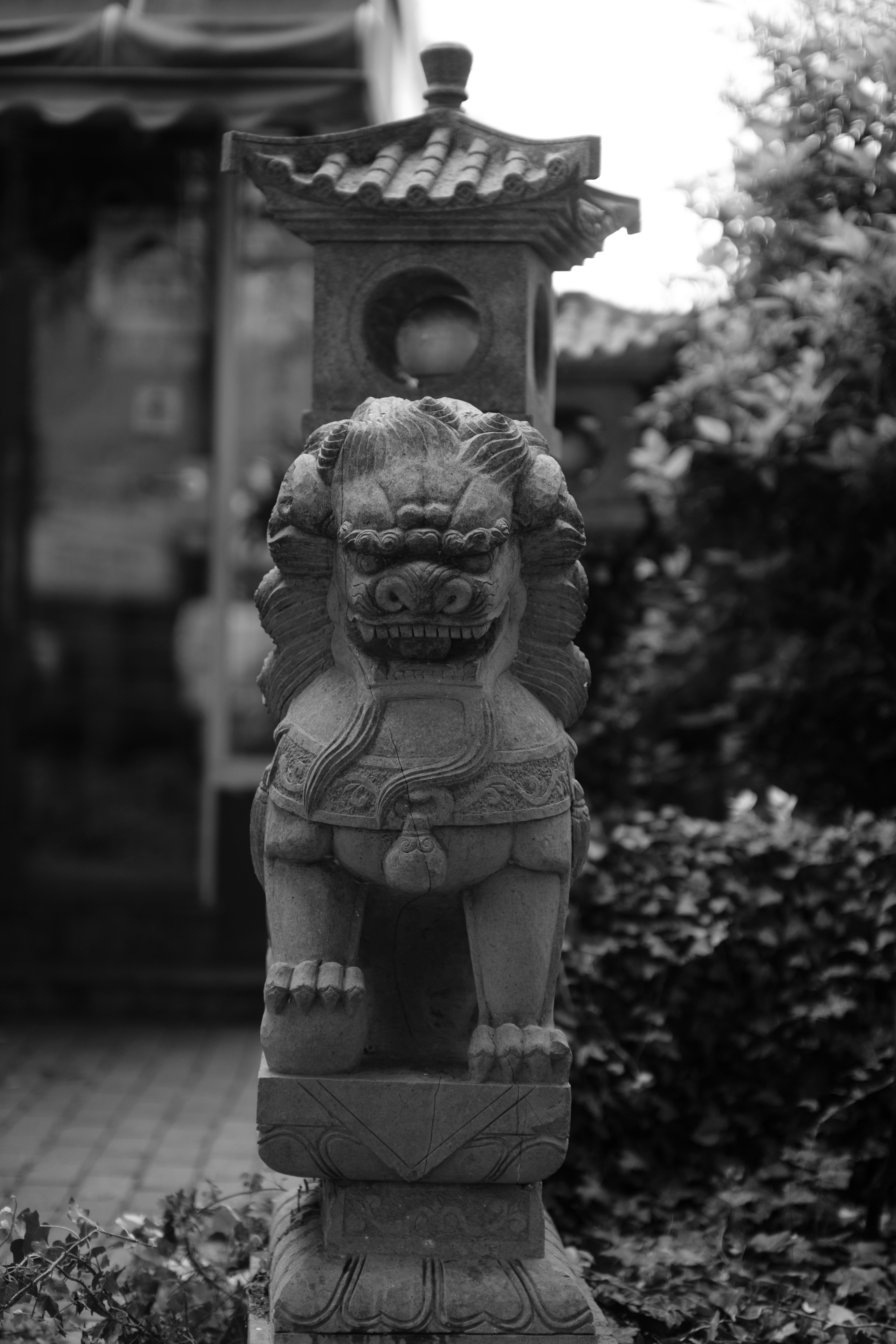 Japanese statue in front of a restaurant