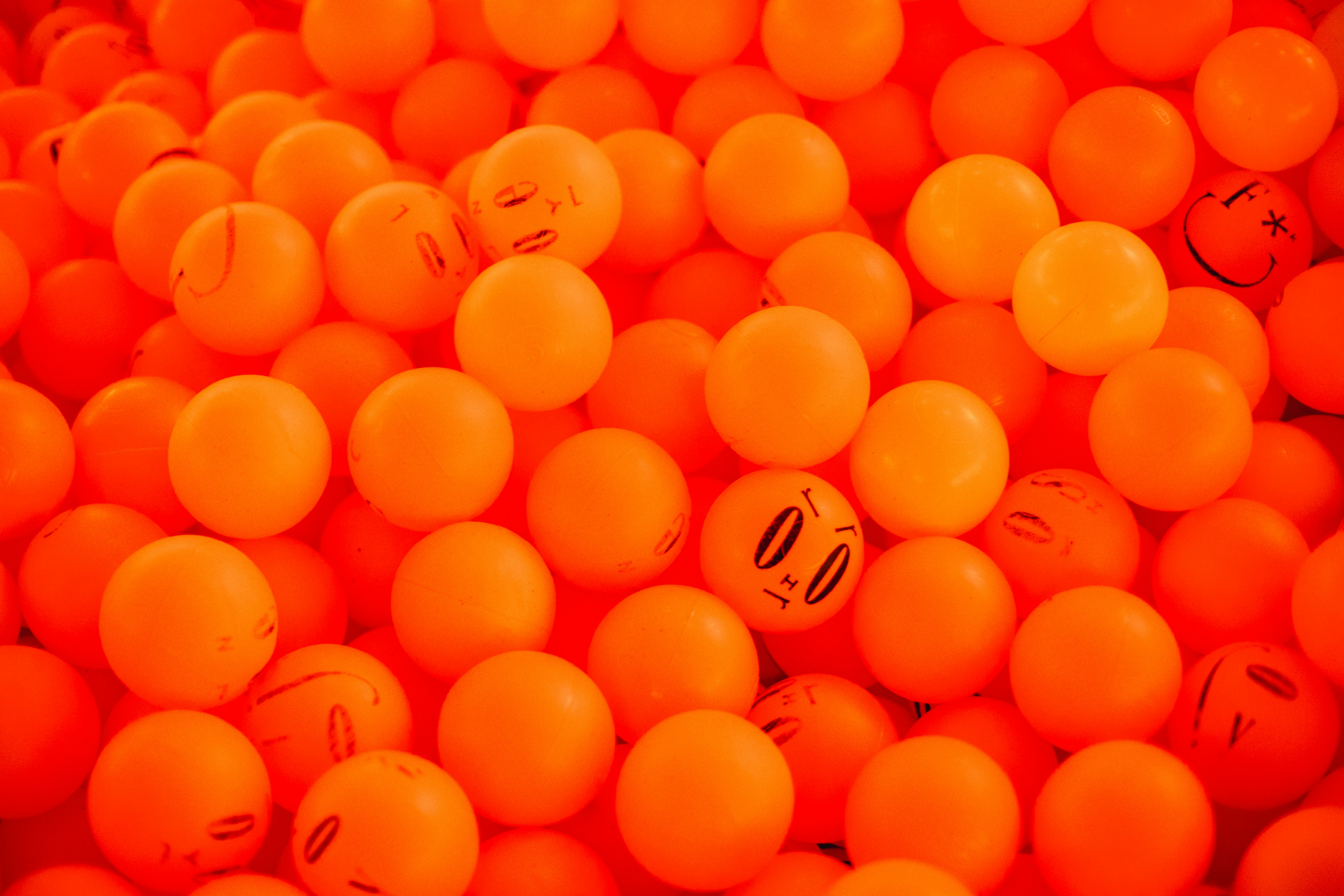 Orange balls with sad faces are displayed.