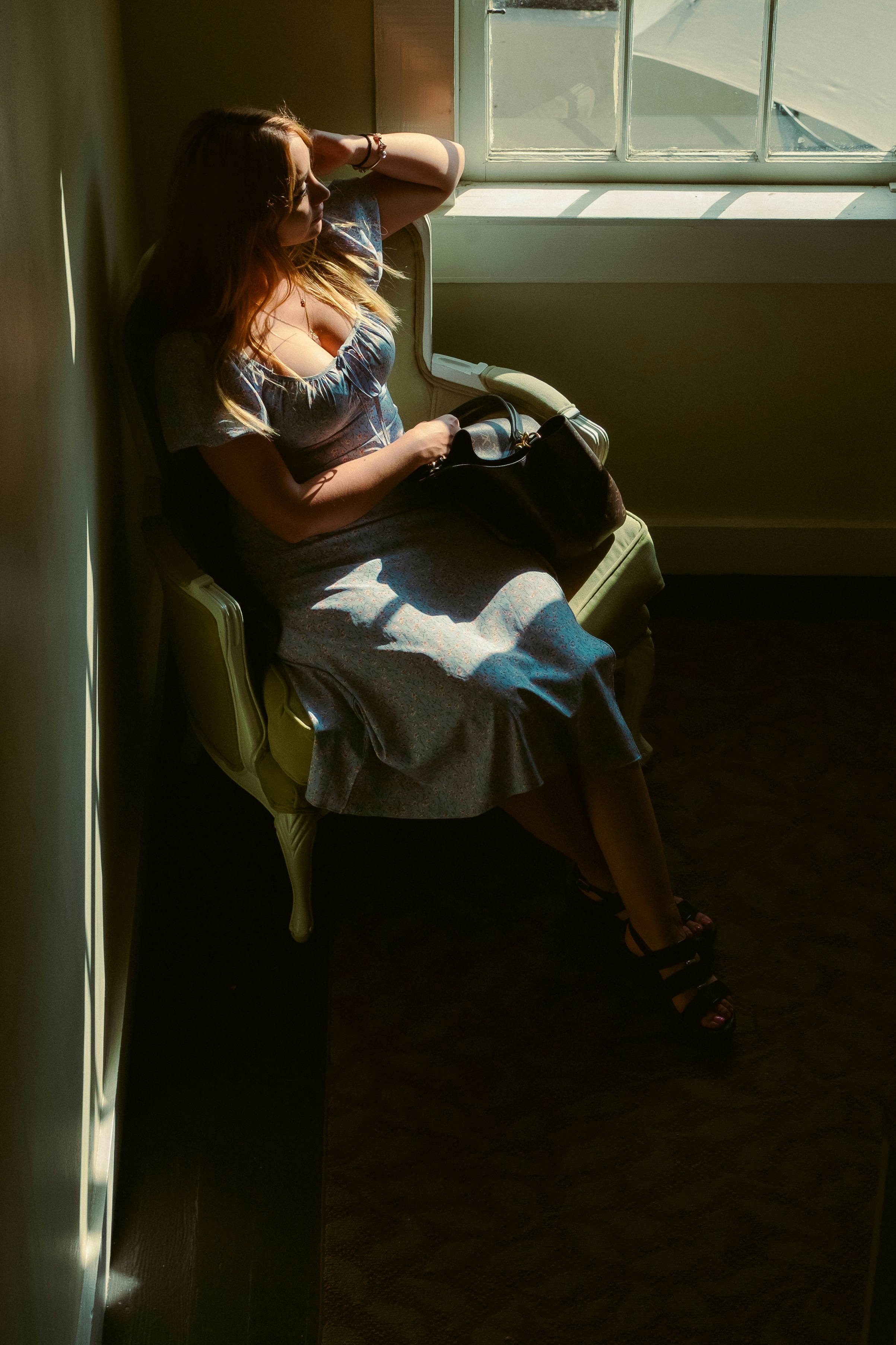 Sunlit Contemplation by the Window