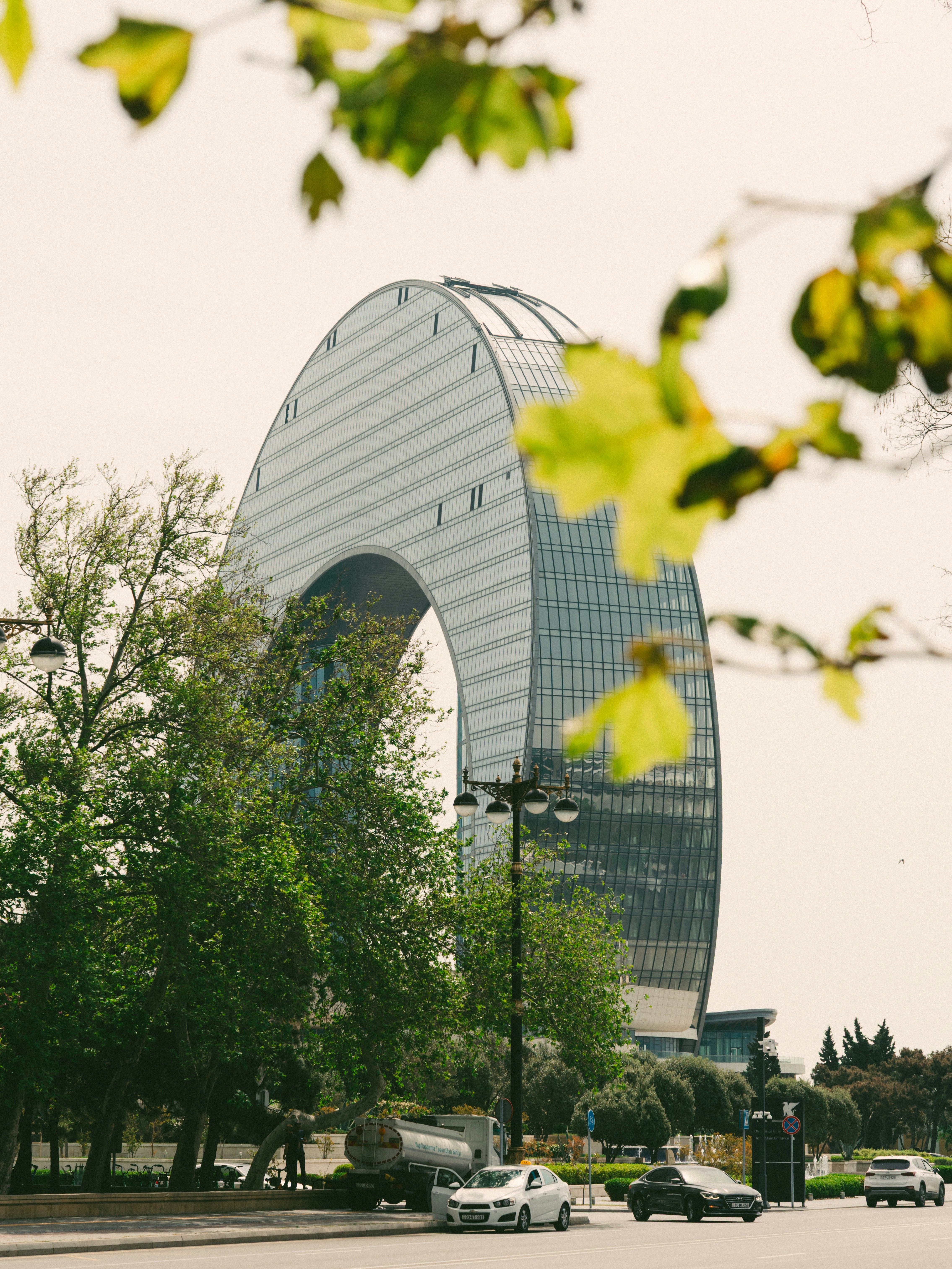Modern building with an arched opening. photo – Free Building Image on ...