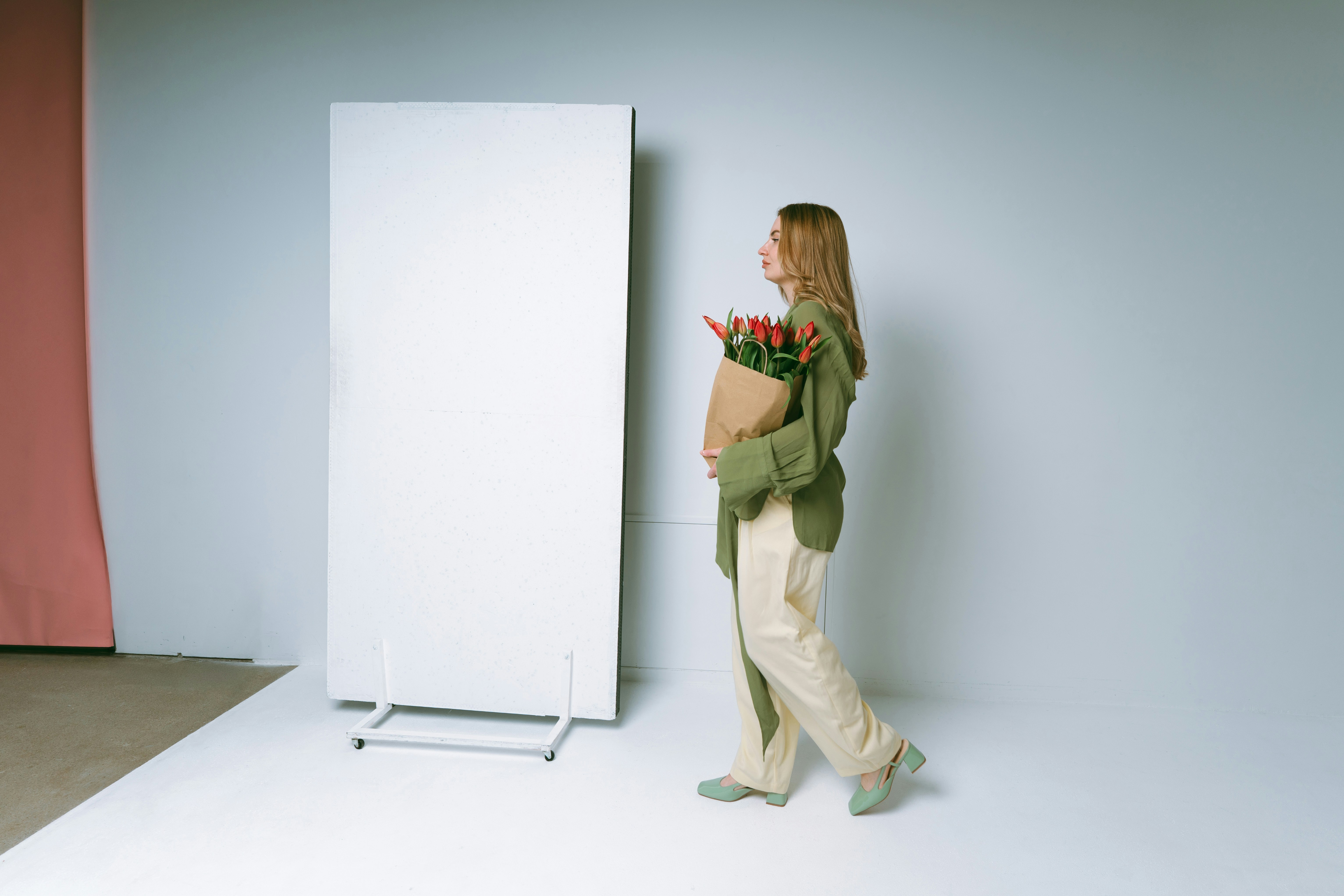 Bouquet in Transit: Silent Walk Through a Studio Corridor