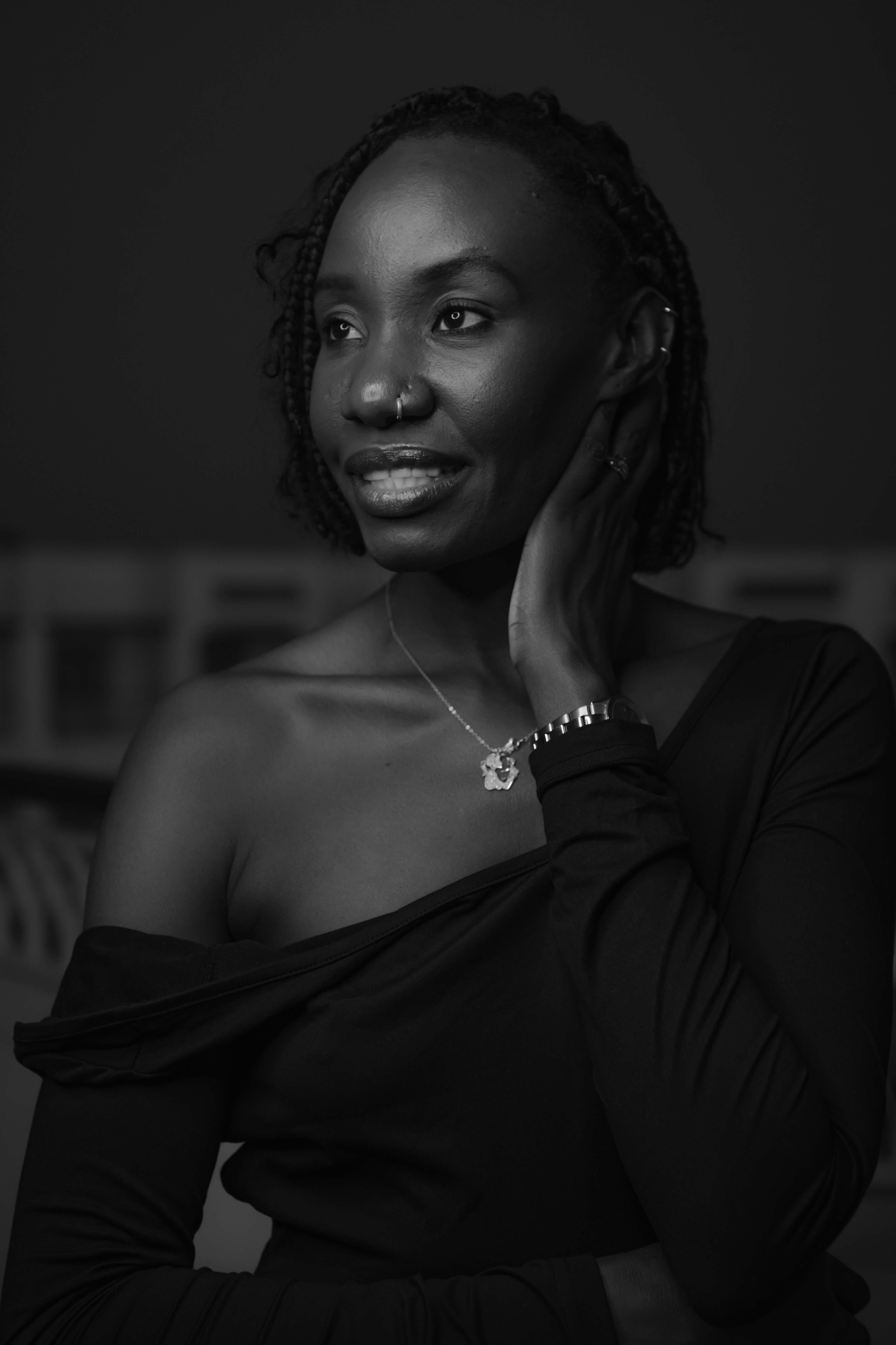 A woman smiles, gazing to the side. photo – Free Portrait Image on Unsplash