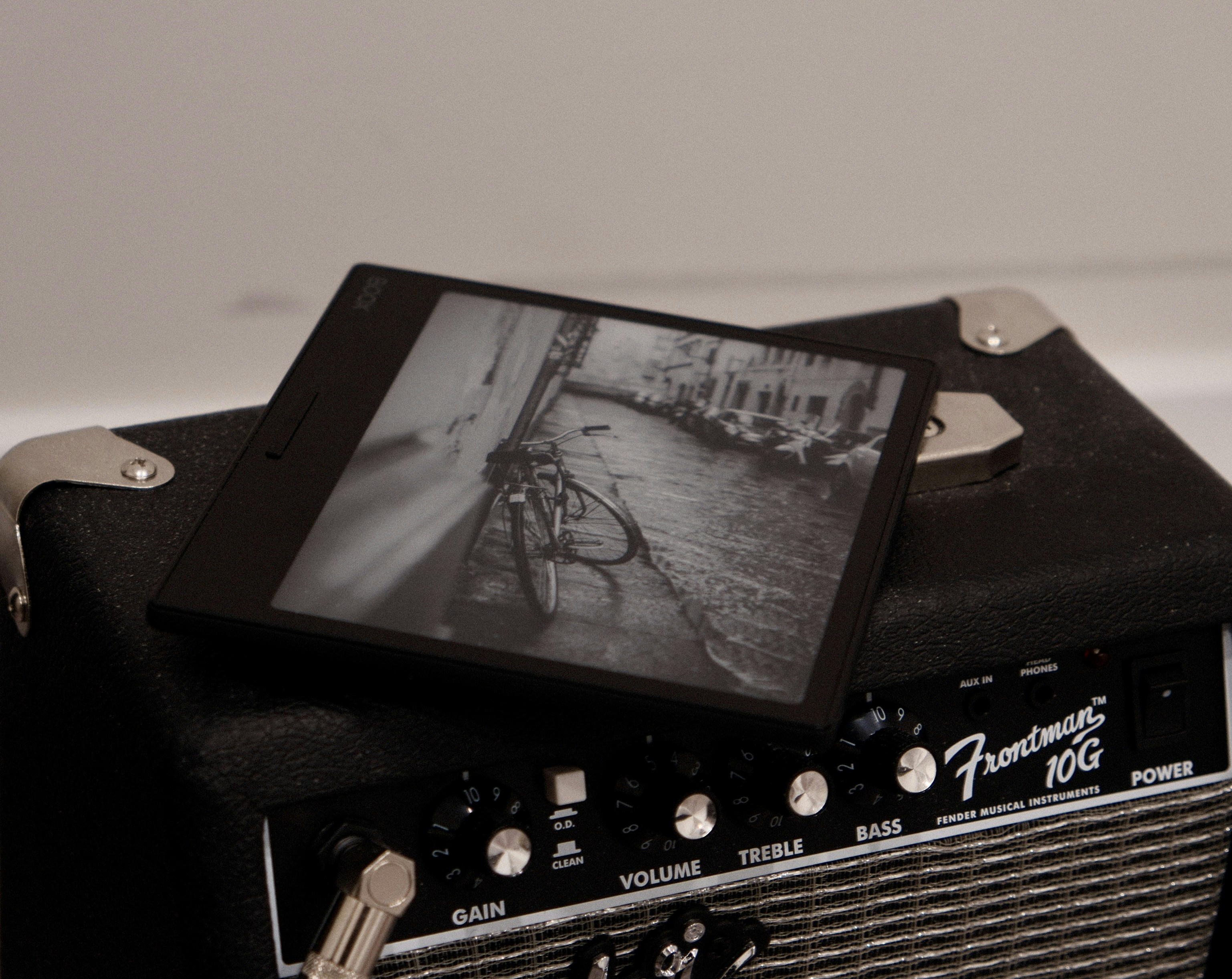 A tablet shows a bicycle on an amplifier. photo – Free Black Image on ...