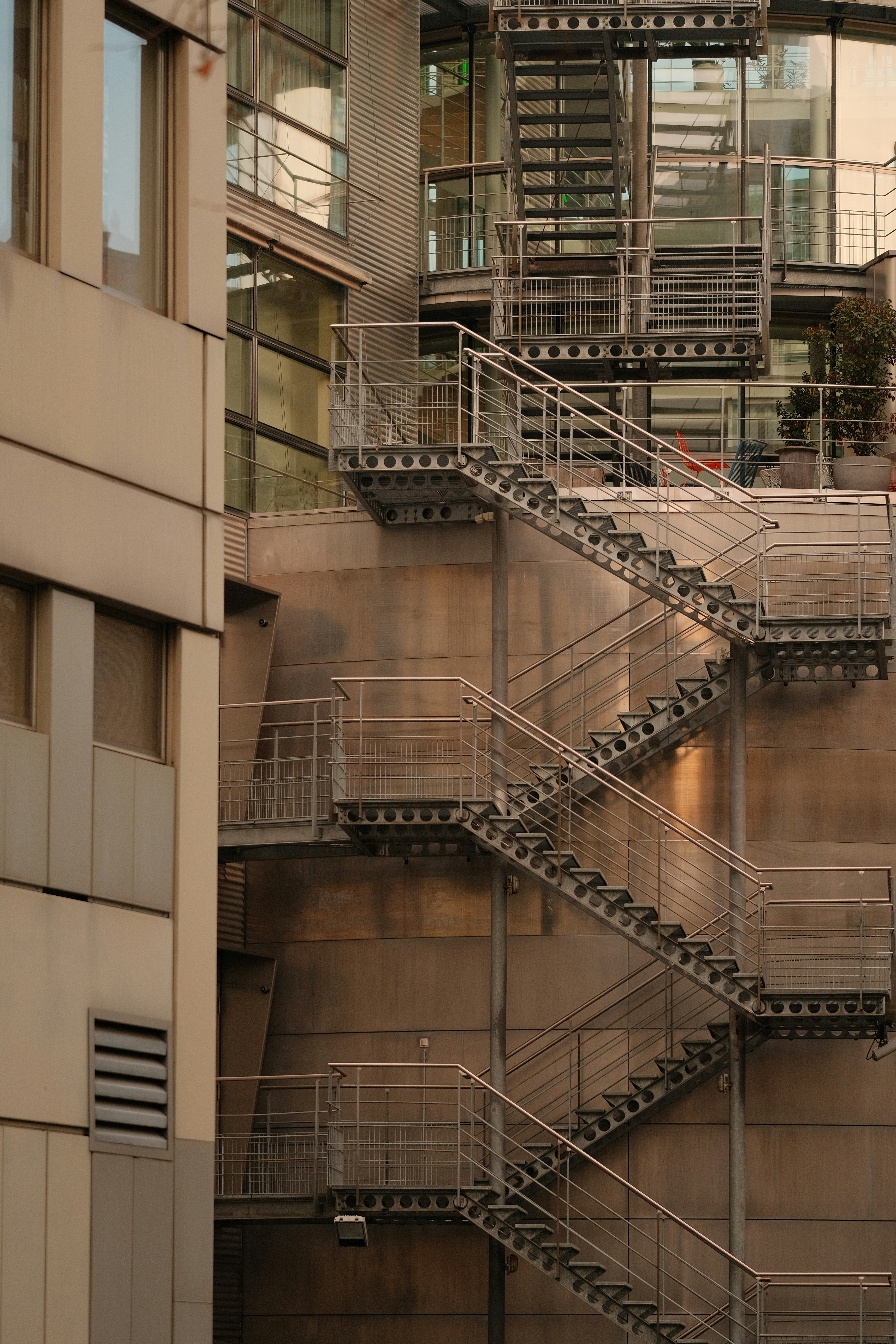 Metal fire escape stairs on a modern building. photo – Free Stairs ...