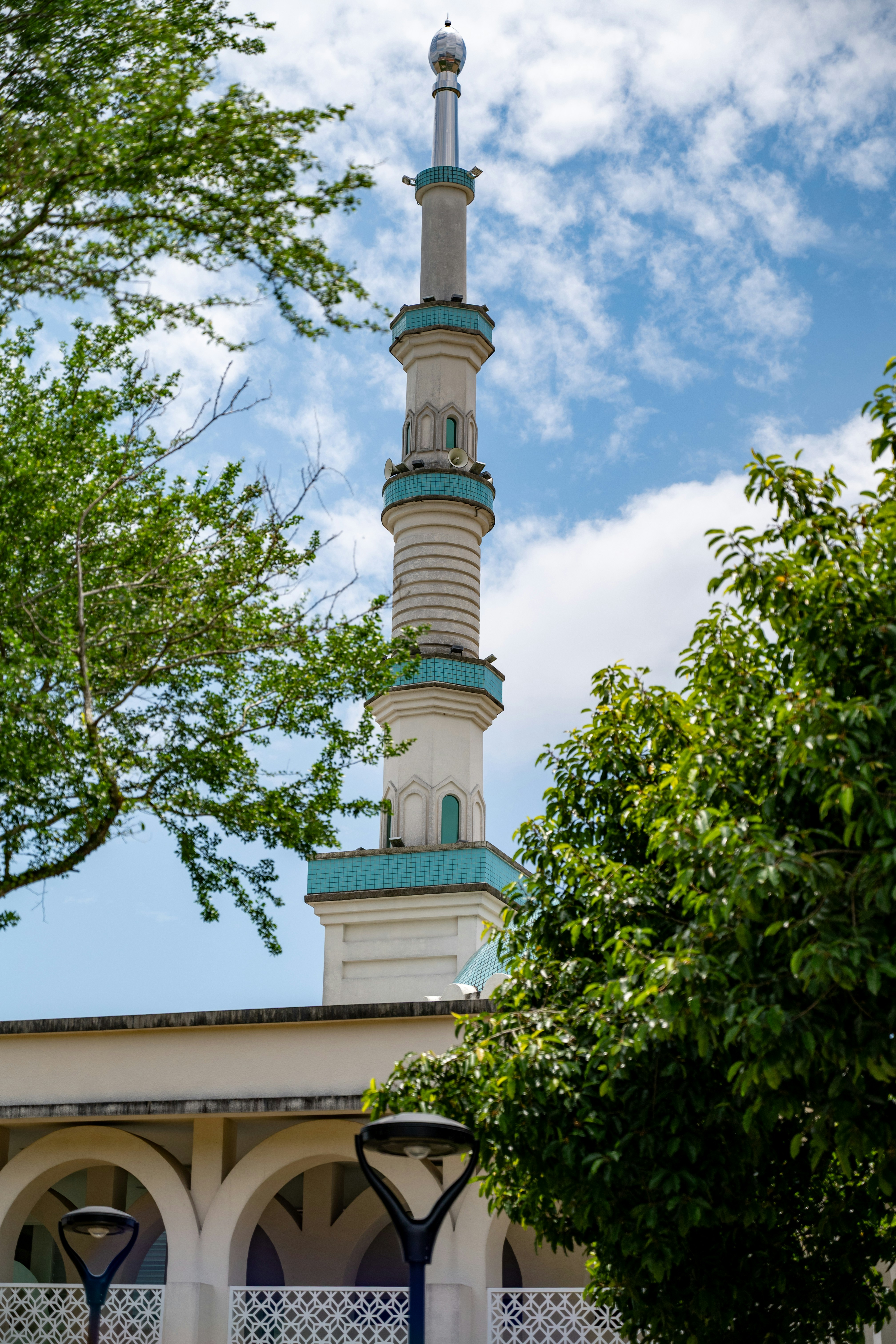 A Serene Spire Amidst Lush Greenery