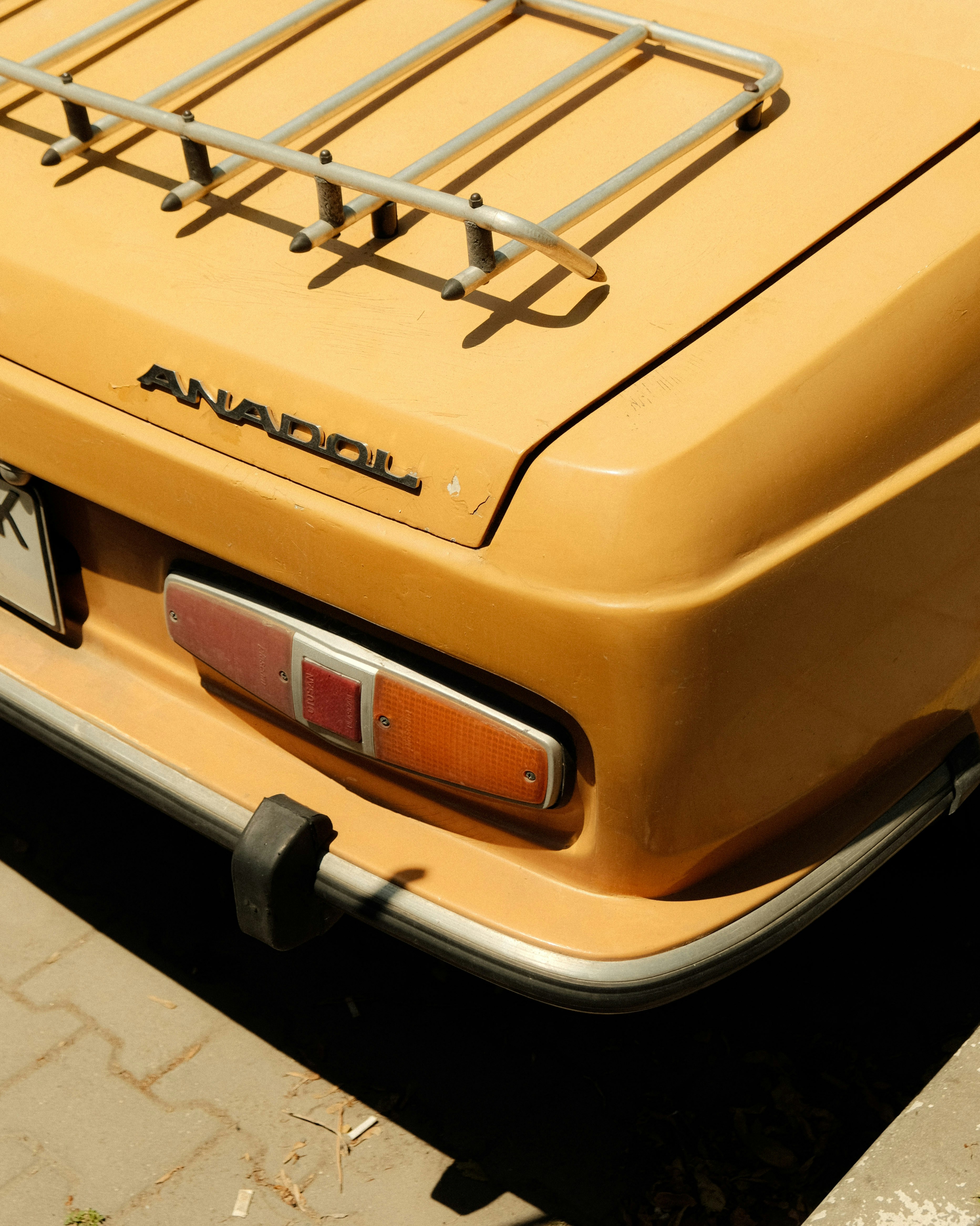 The rear end of a vintage anadol car. photo – Free Car Image on Unsplash