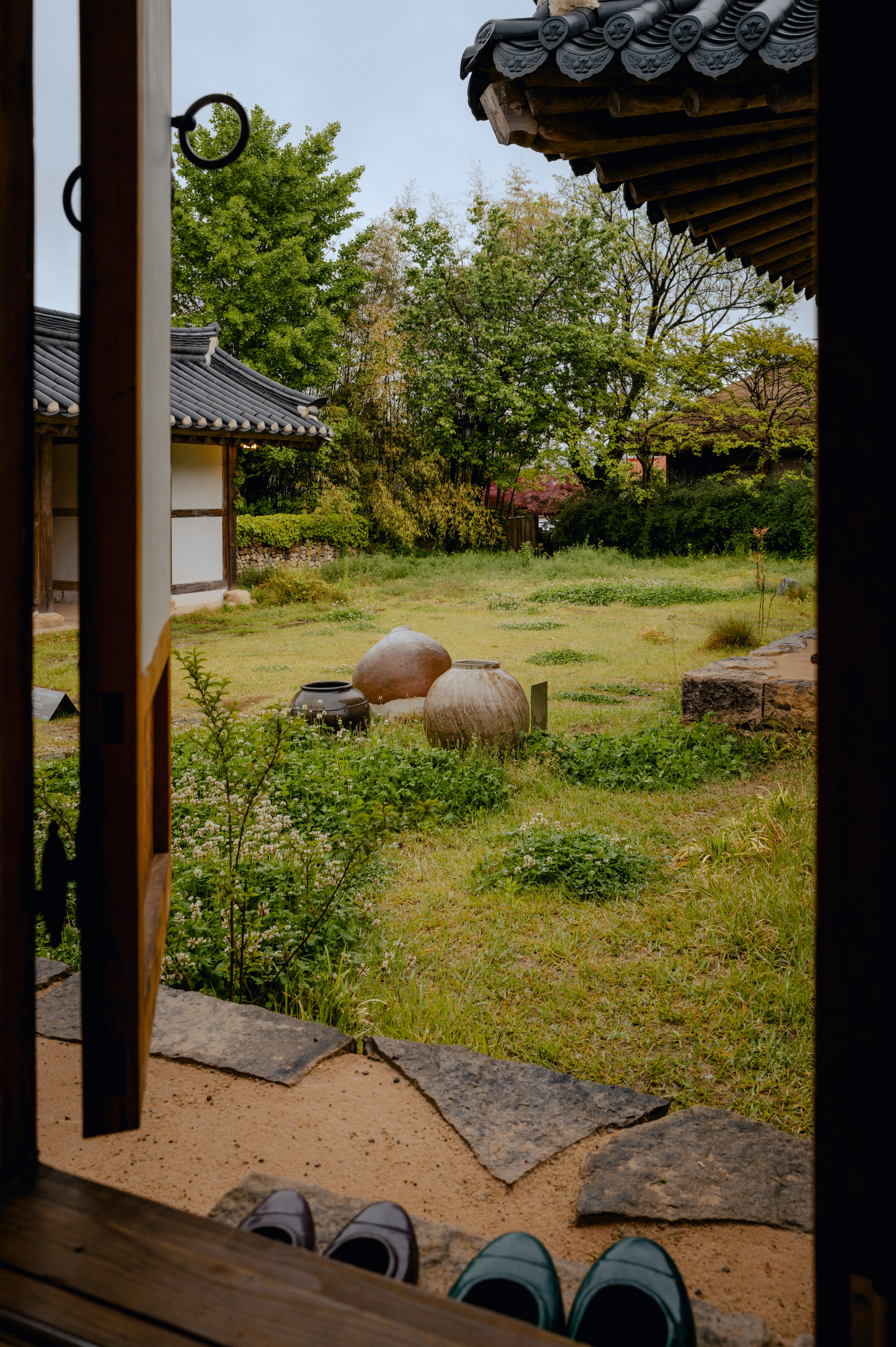 Earth-Jars in a Sunlit Zen Courtyard