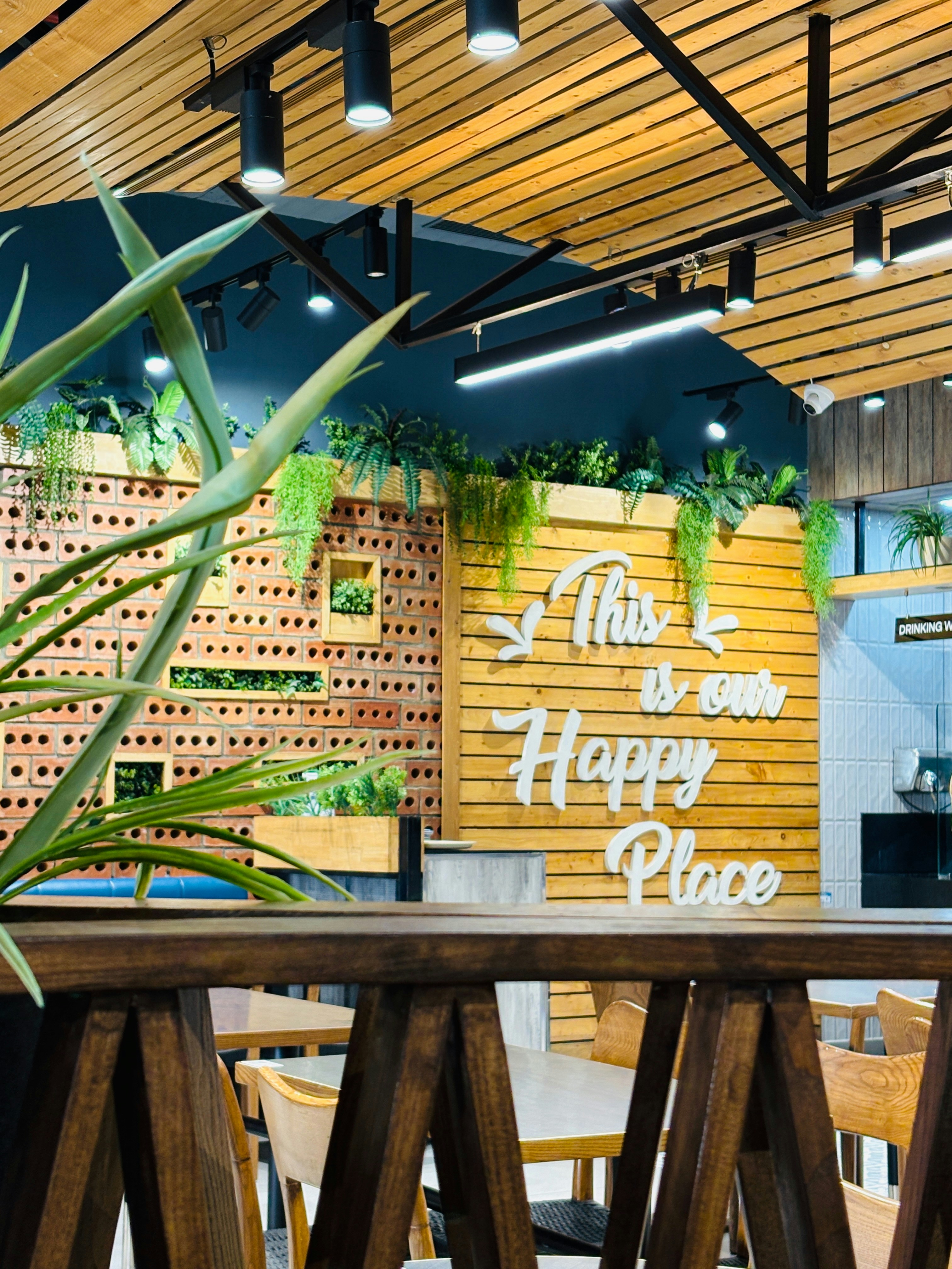 This Is Our Happy Place: A Plant-Laced Café Interior