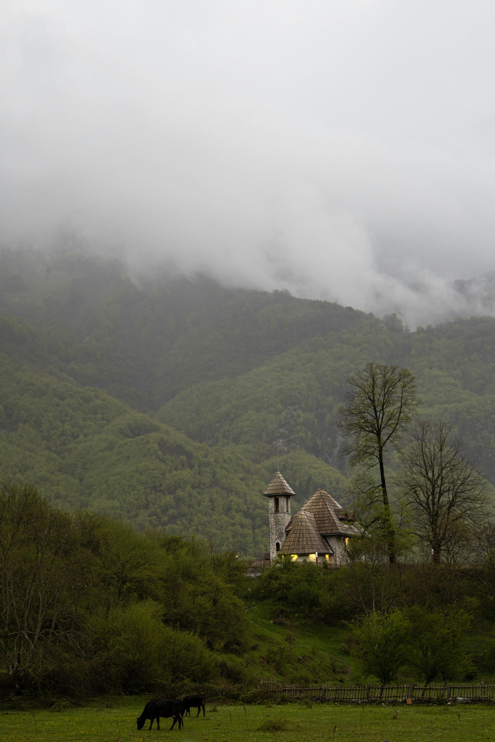 Mist Veil Over the Hilltop Chapel