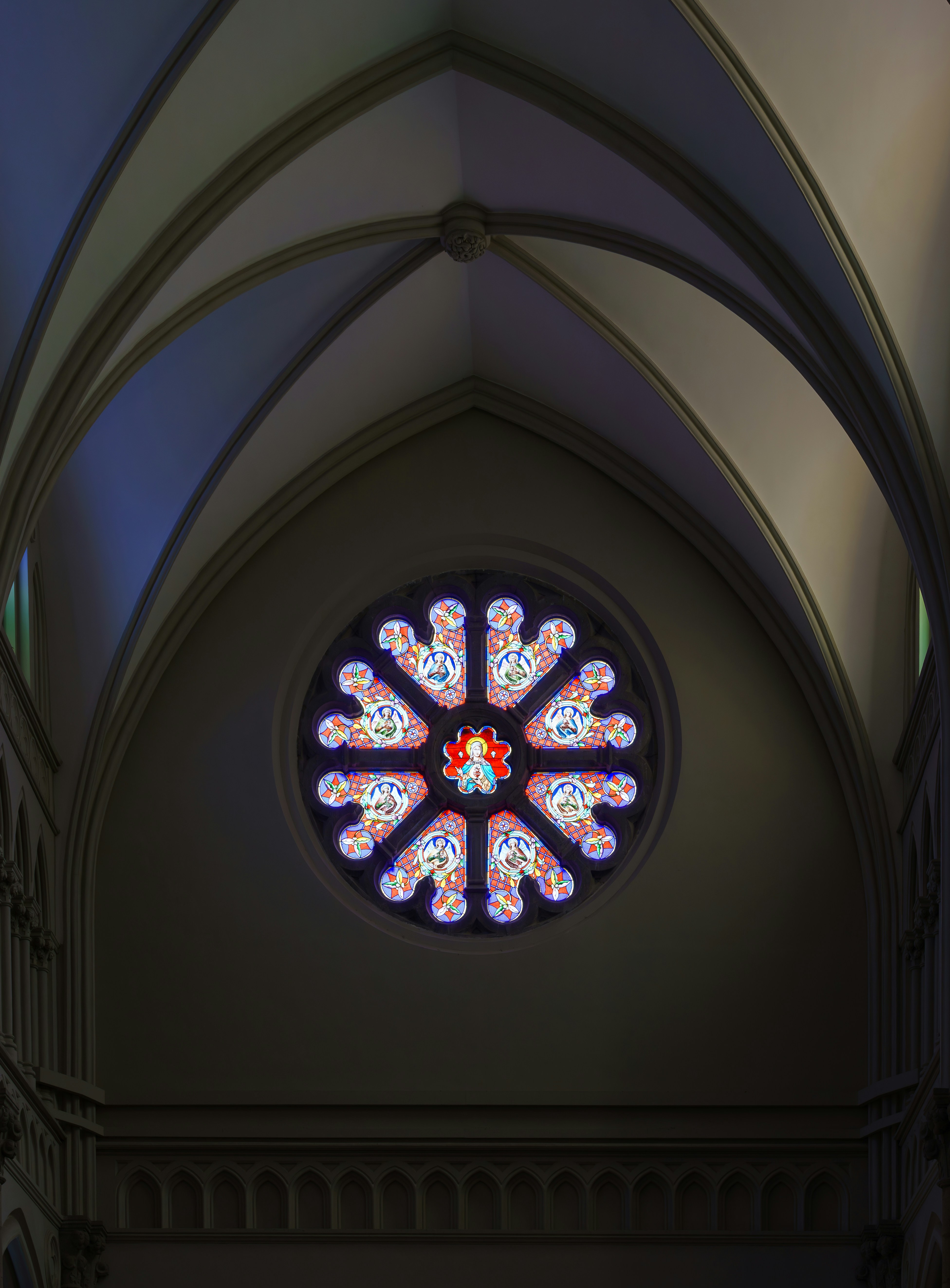 Glow of the Rosette: Neon Colors Illuminate a Gothic Nave