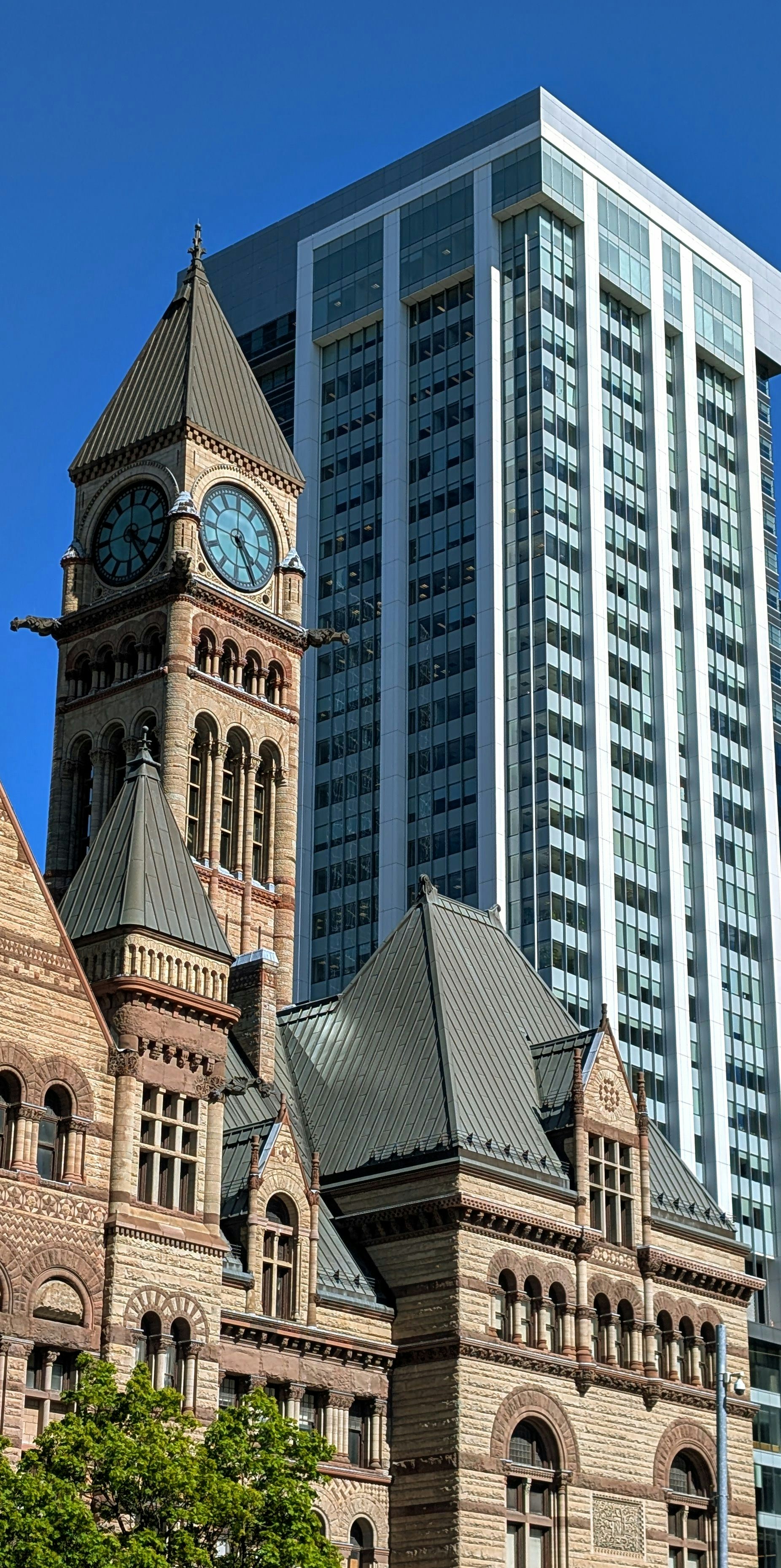 Historic building juxtaposed with a modern skyscraper. photo – Free ...
