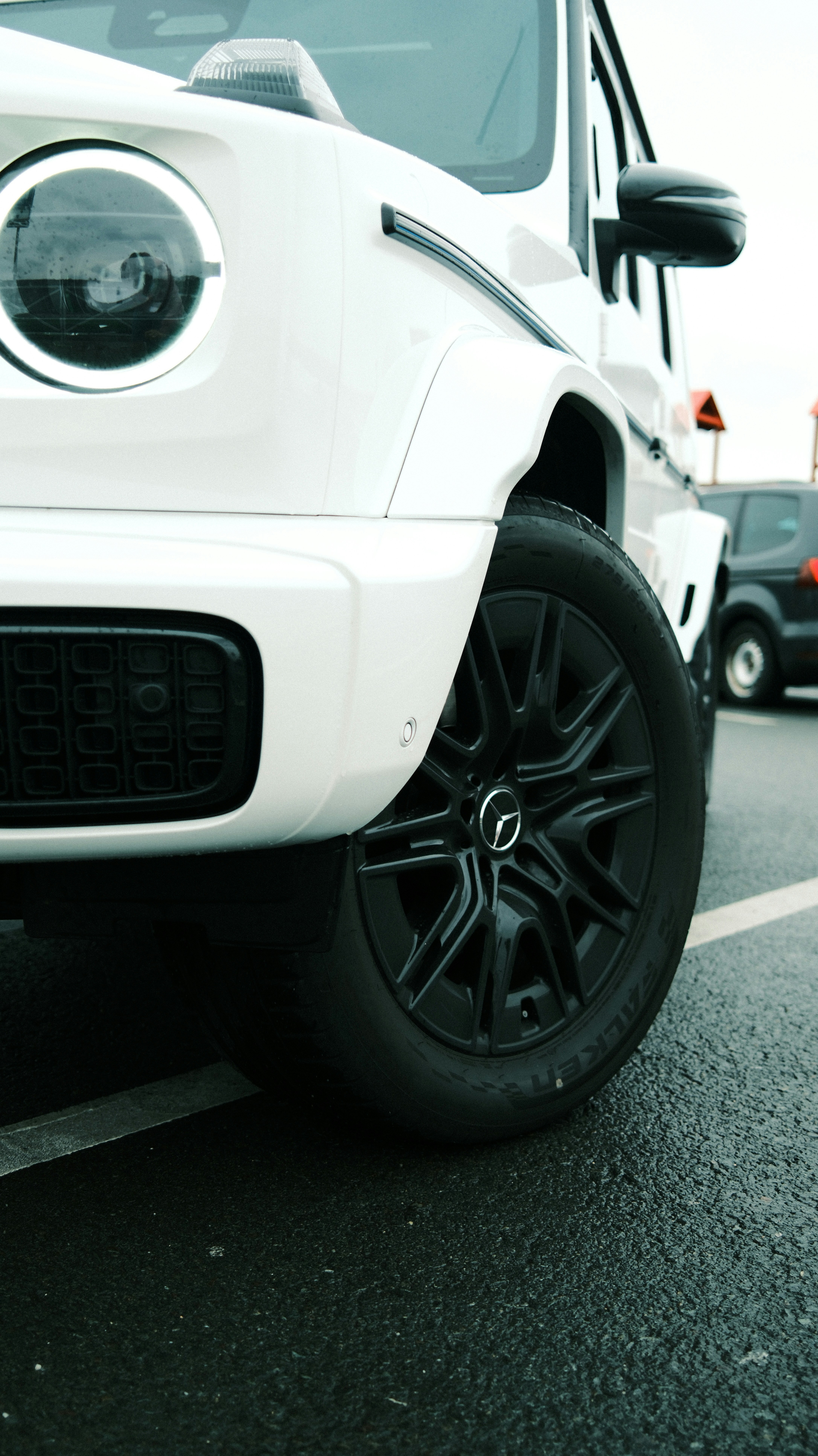 A white mercedes-benz g-wagon with black rims. photo – Free Car Image ...