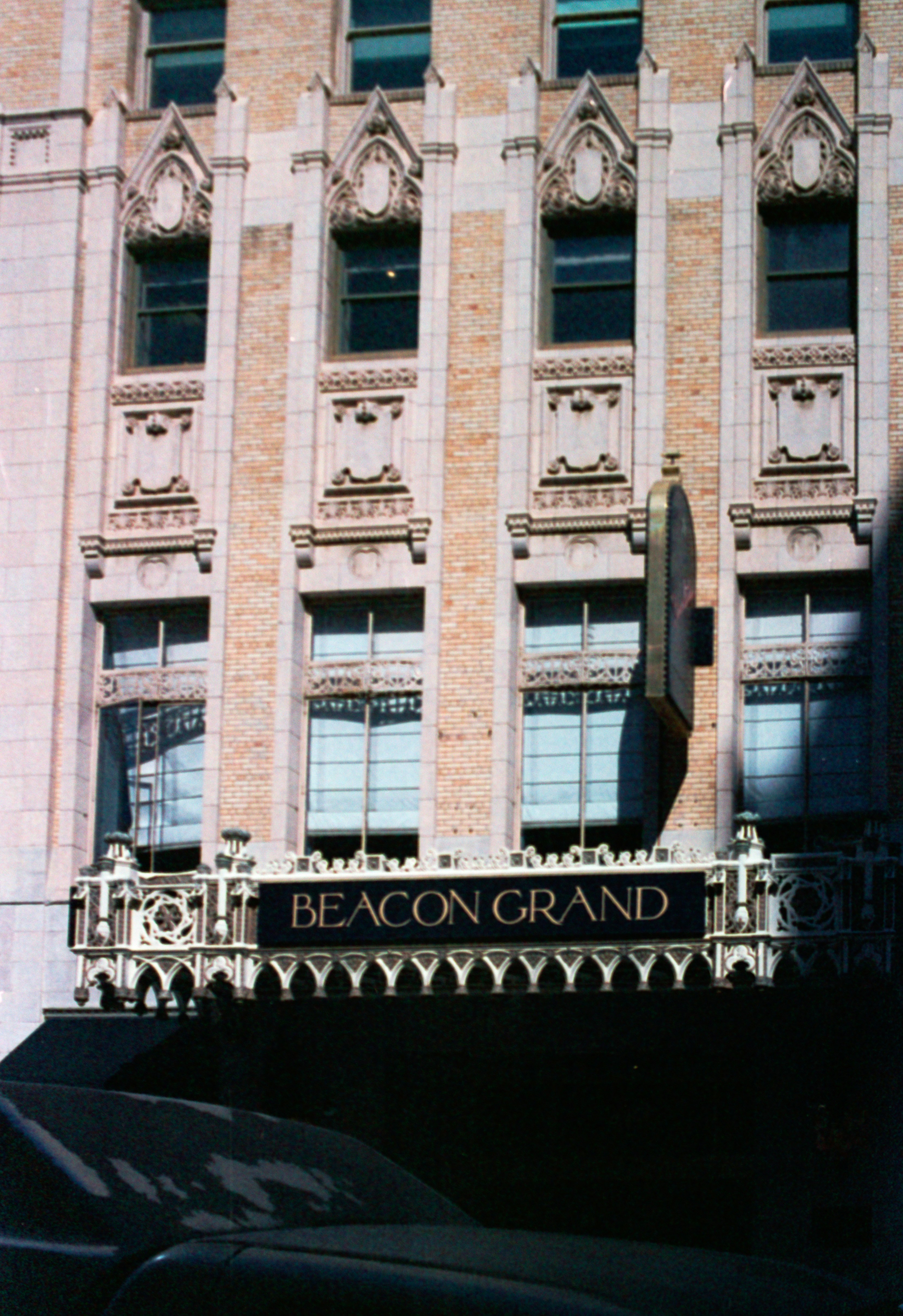 The beacon grand hotel's facade is visible. photo – Free San francisco ...