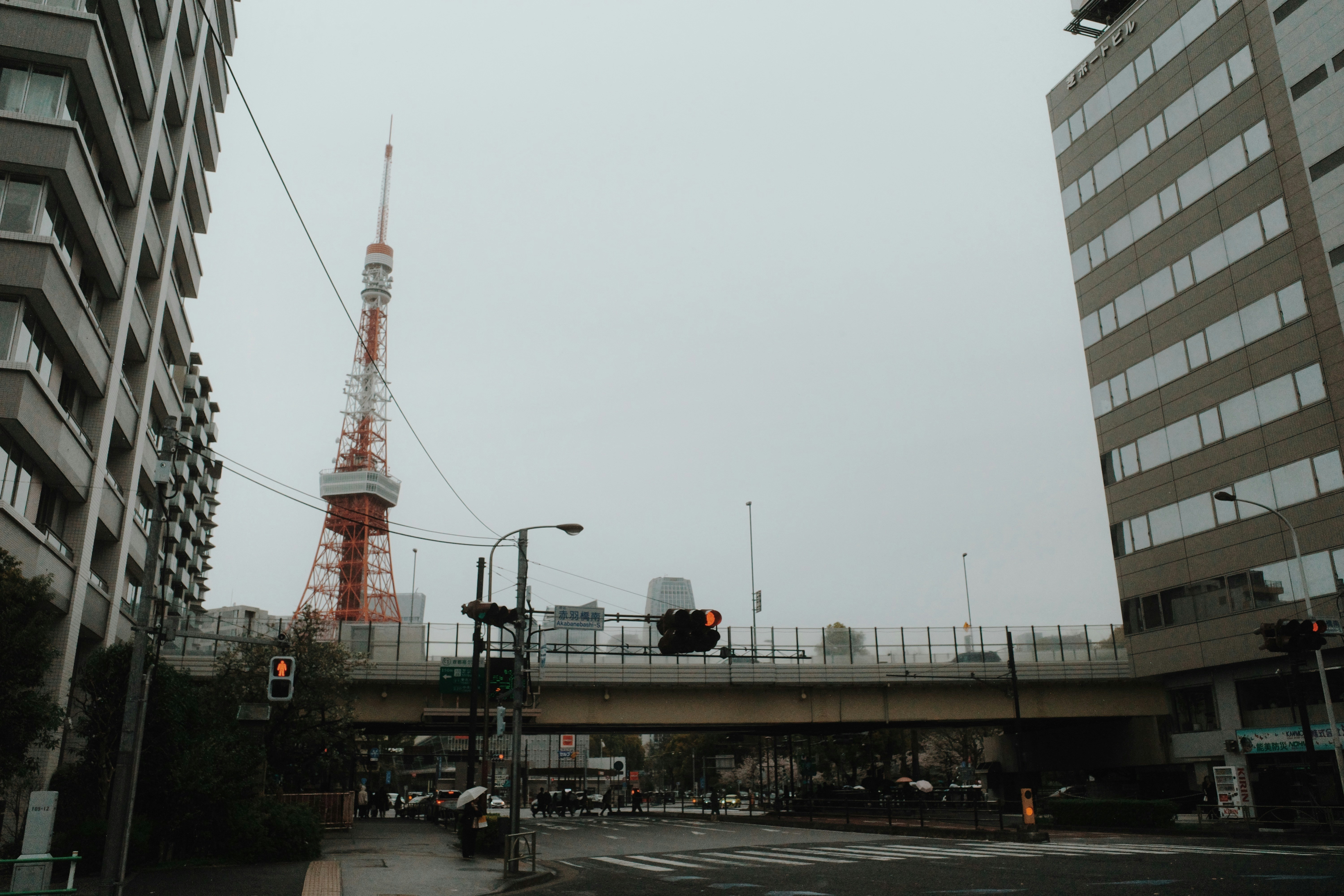 Tokyo tower stands tall on a cloudy day. photo – Free Building Image on ...