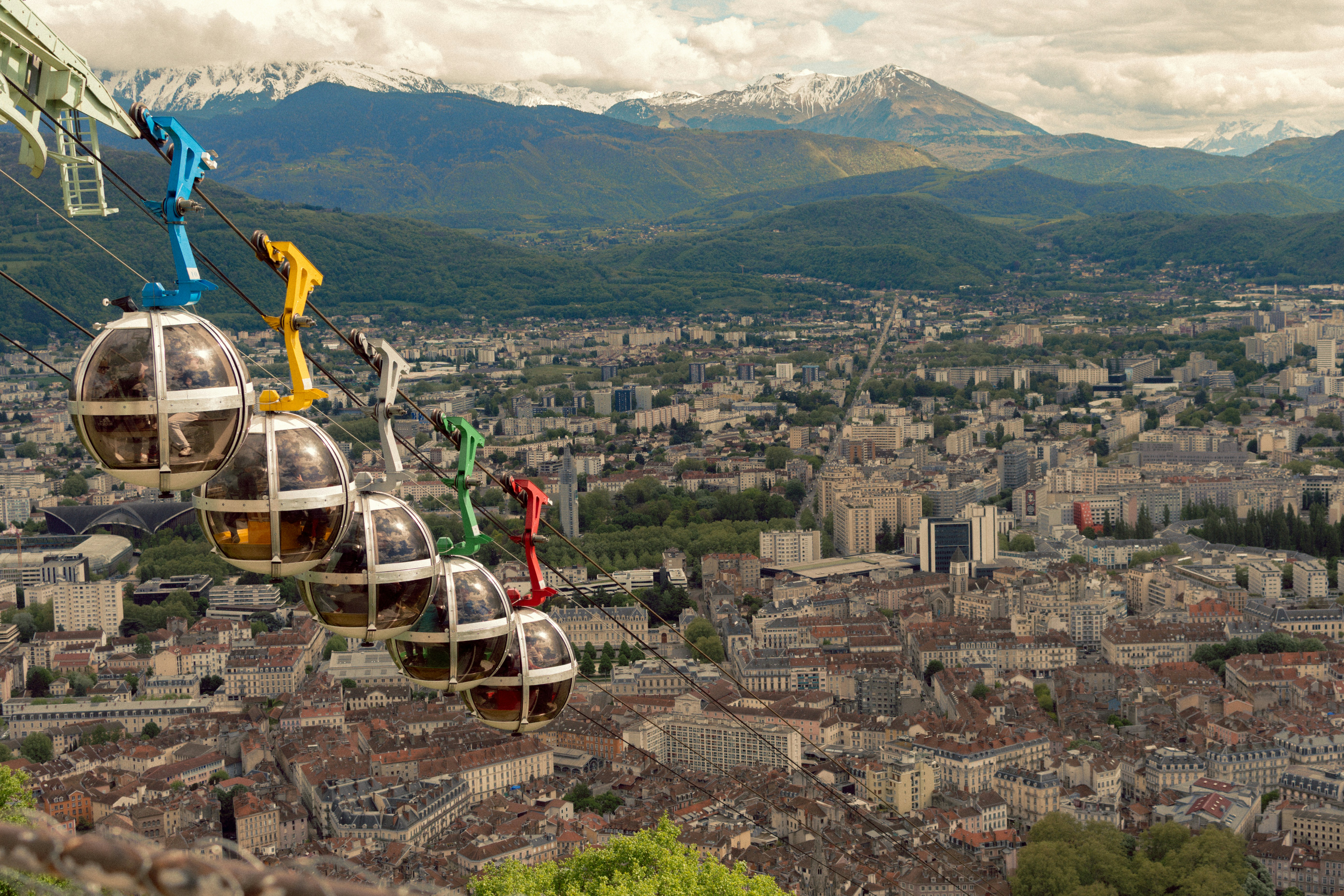 Skyward Journey: A Glimpse of the Alpine Cityscape