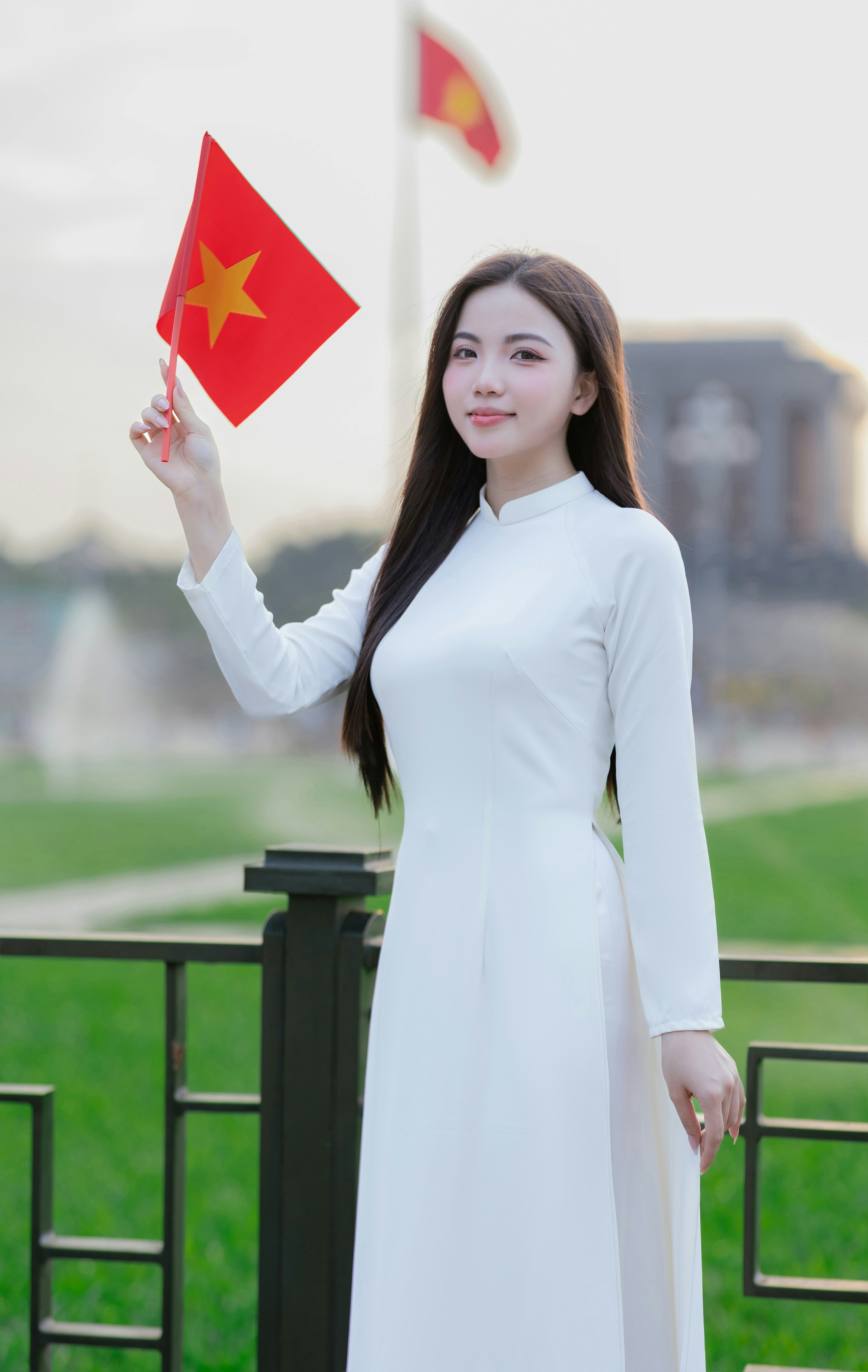 Quiet Pride in White: Portrait with the Vietnamese Flag