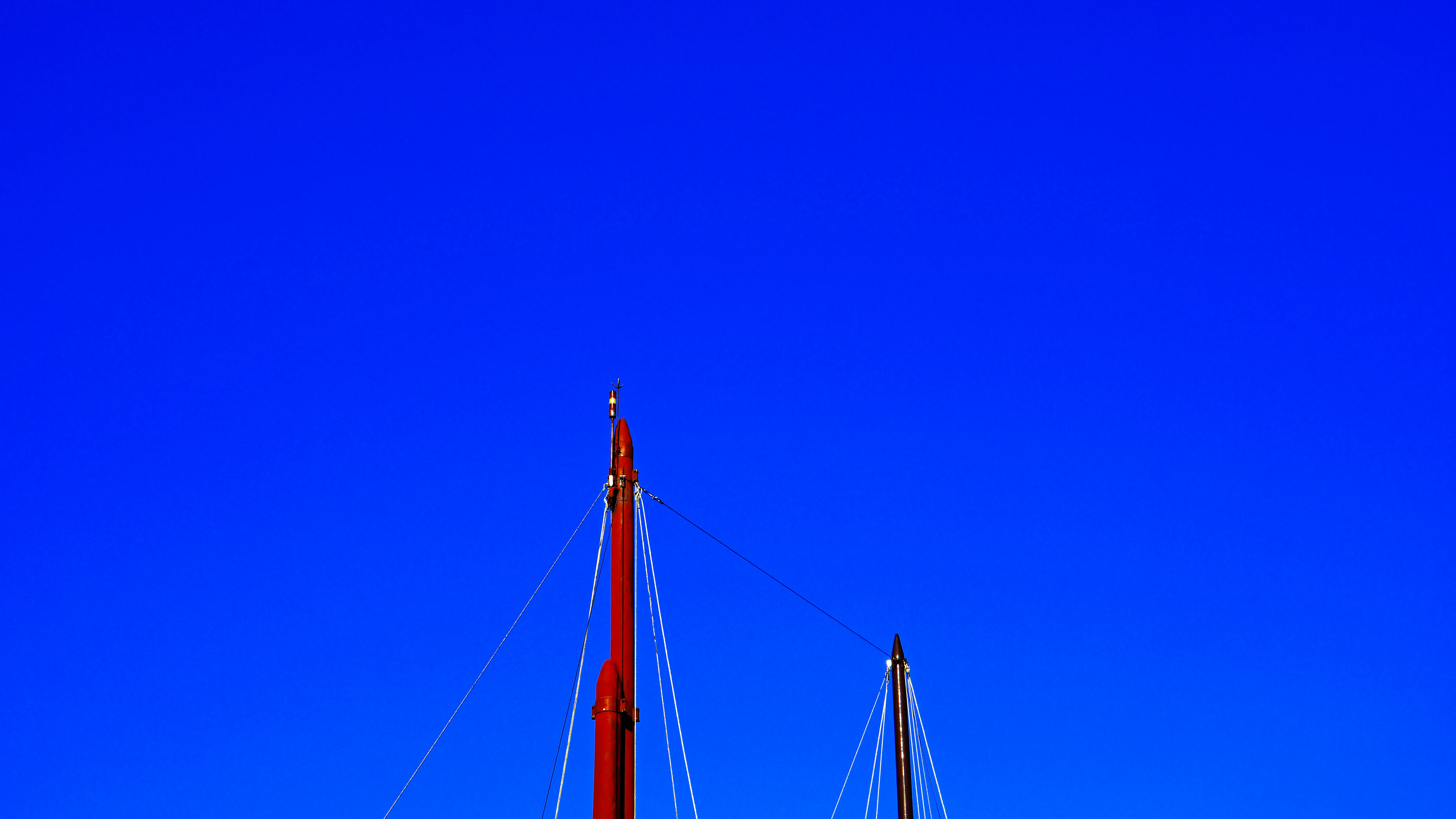 Masts Against the Infinite Blue