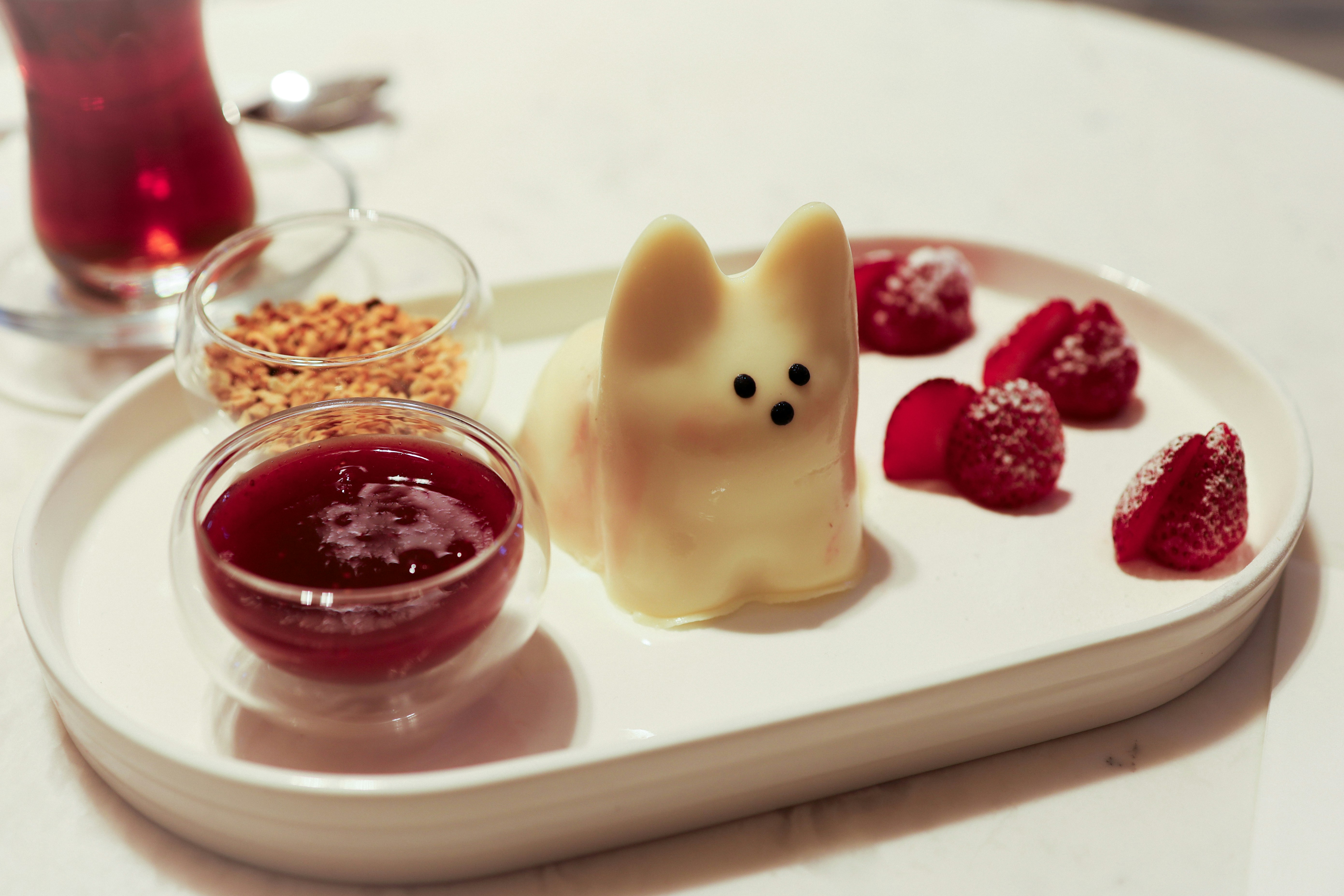 Ivory Bunny Under Raspberry Glaze: A Delicate Dessert Still Life