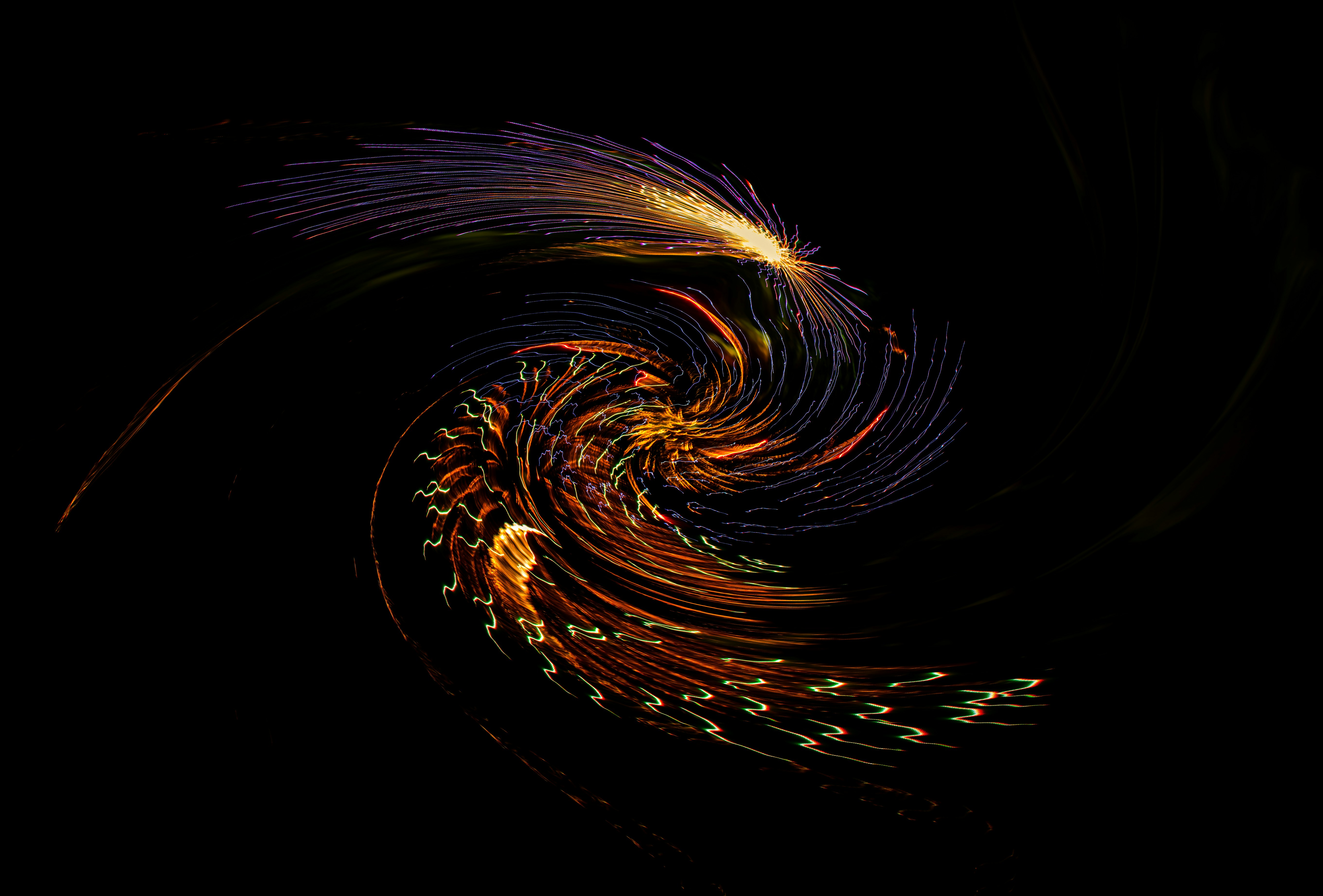 Fireworks exploding in a spiral pattern. photo – Free Abstract Image on ...