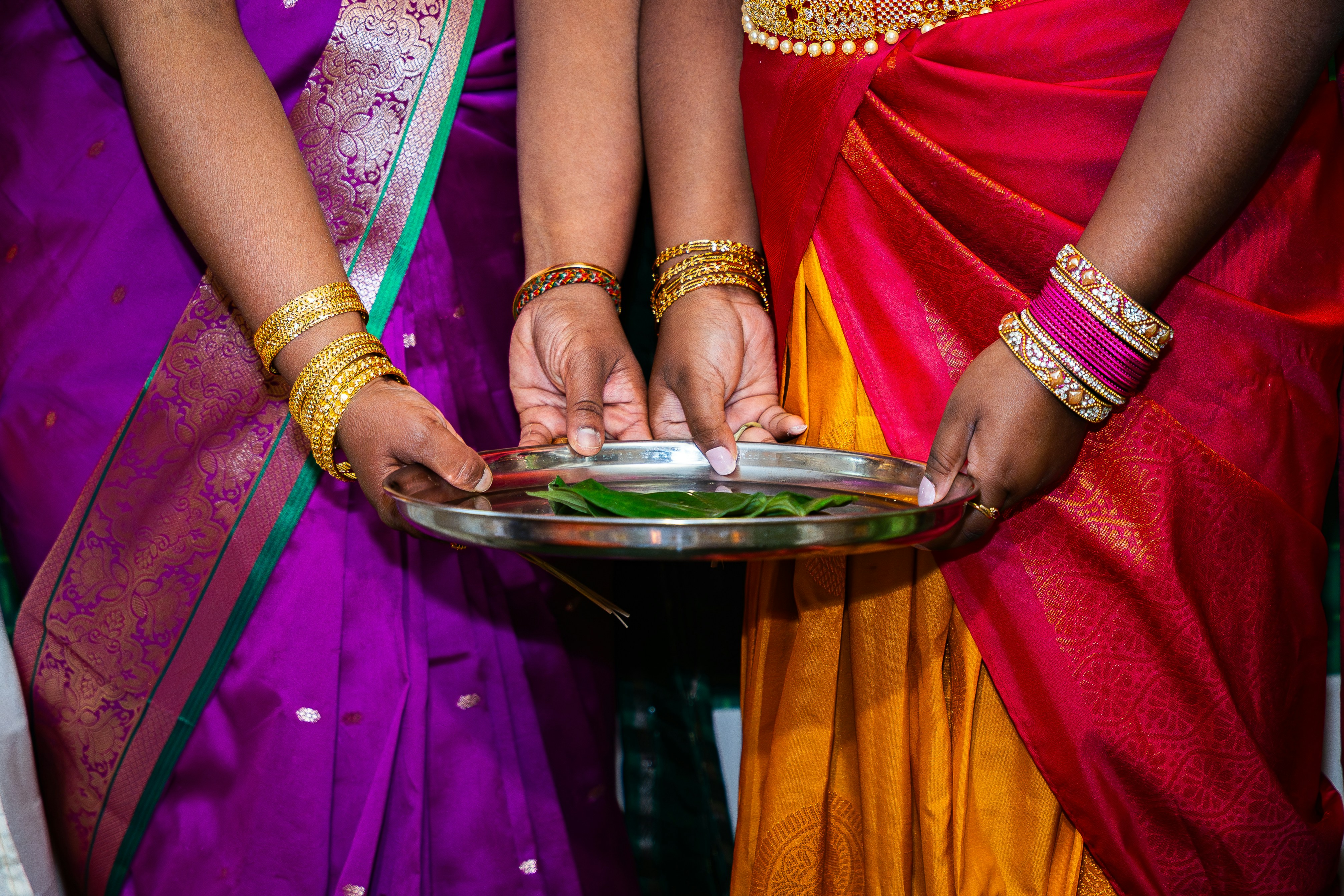 Women hold a plate during an indian ceremony. photo – Free Ceremony ...