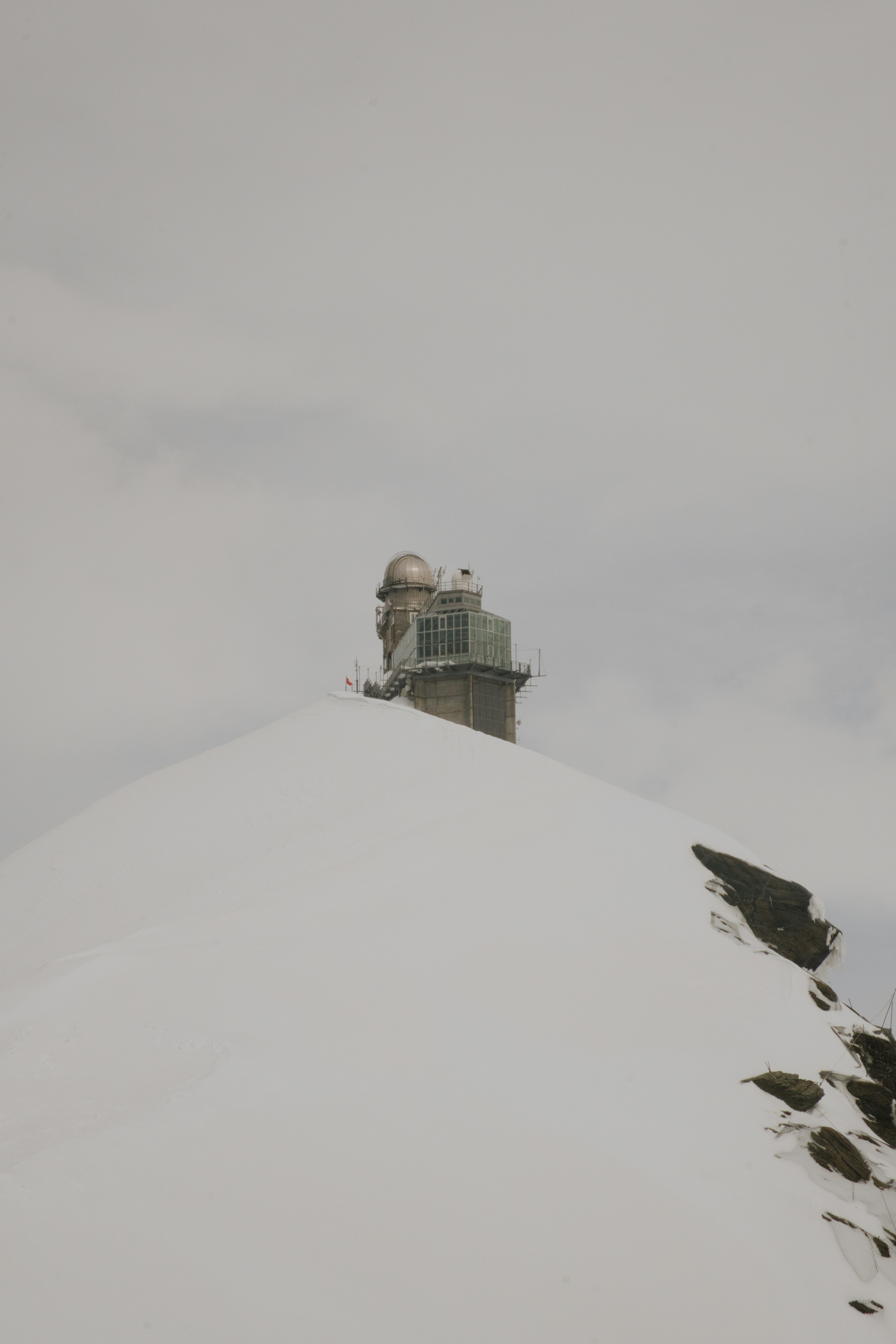 Summit Beacon: A Snowbound Observatory Crown on the Crest