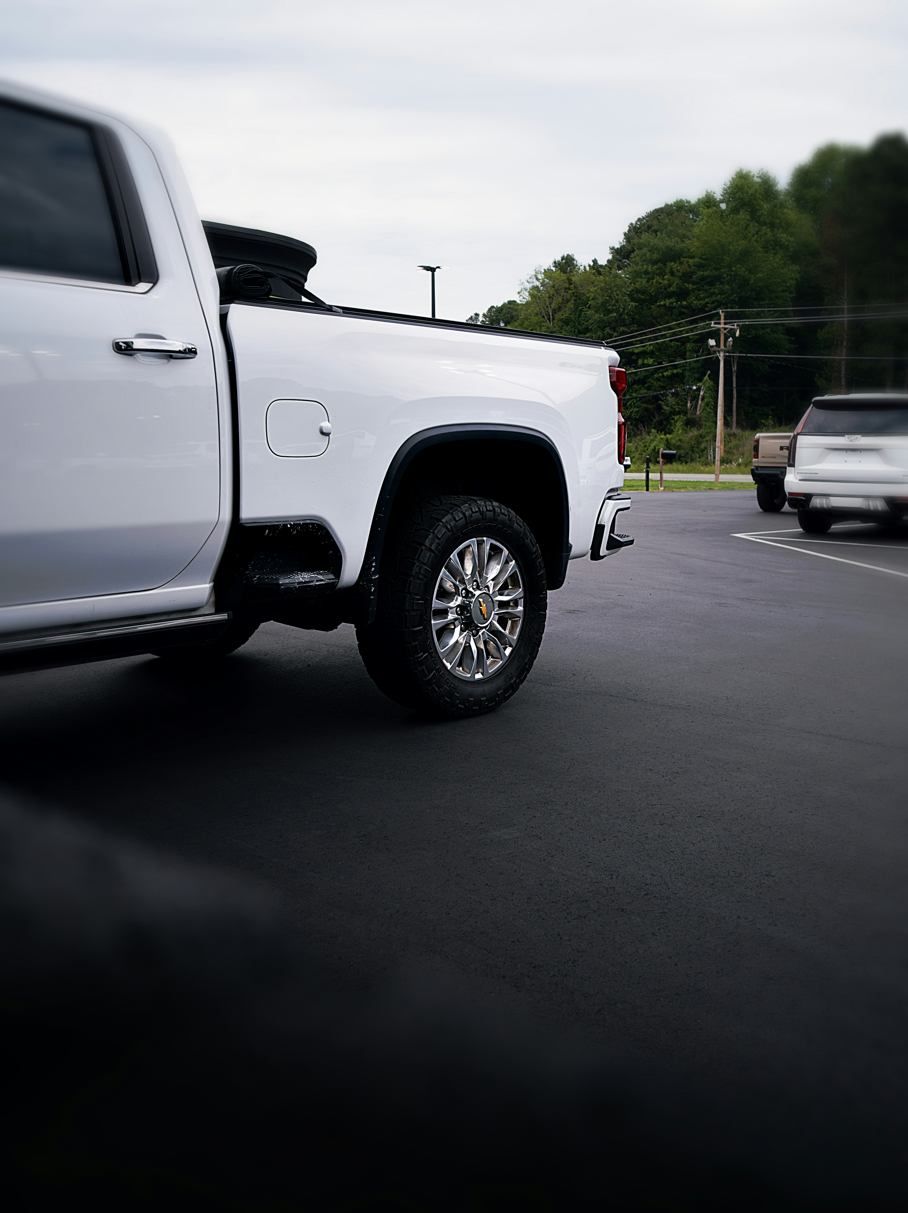 White Pickup at the Edge of the Lot
