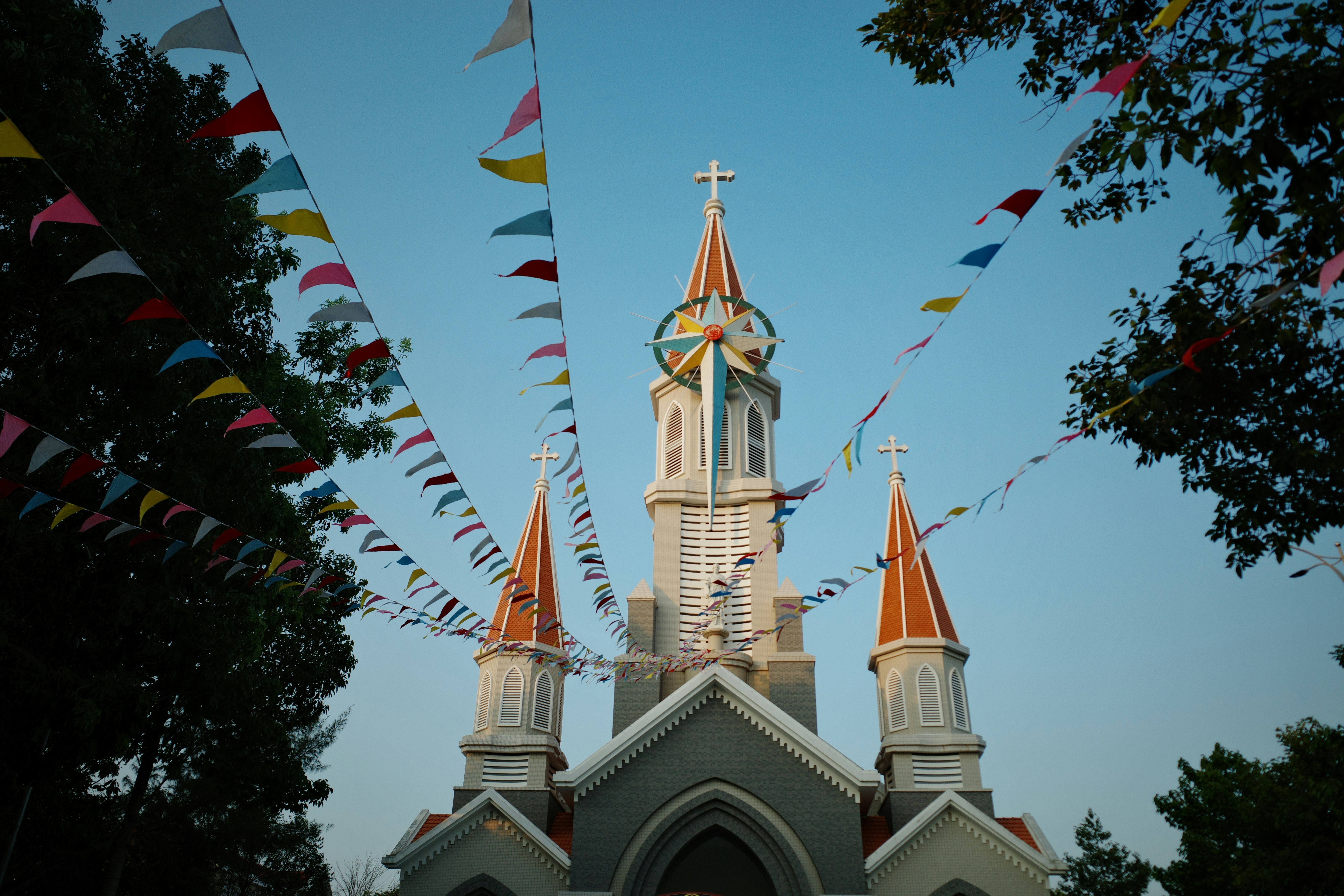 Colorful Chapel Spires under Festive Streamers