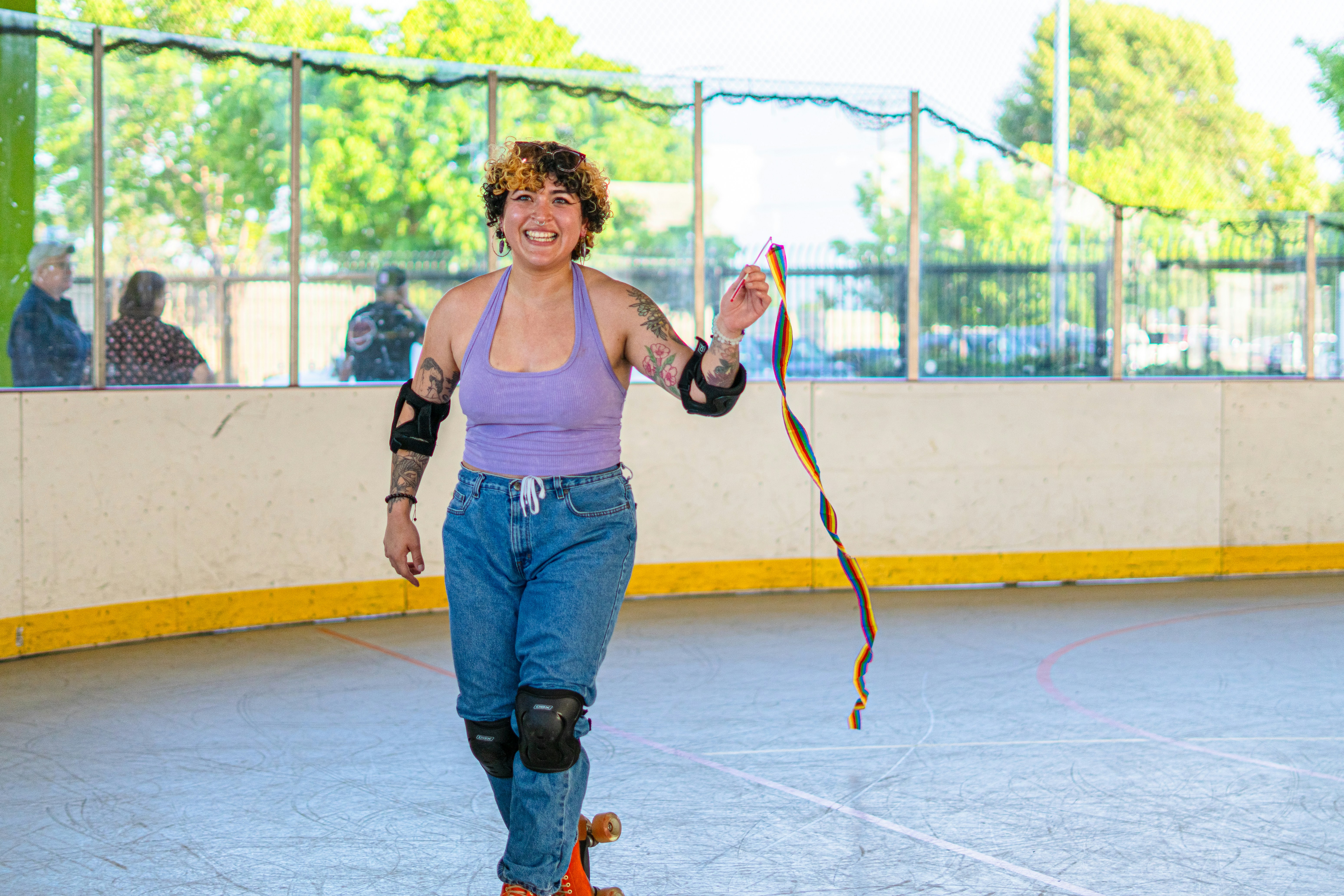 A roller derby skater happily poses for the camera. photo – Free Art ...