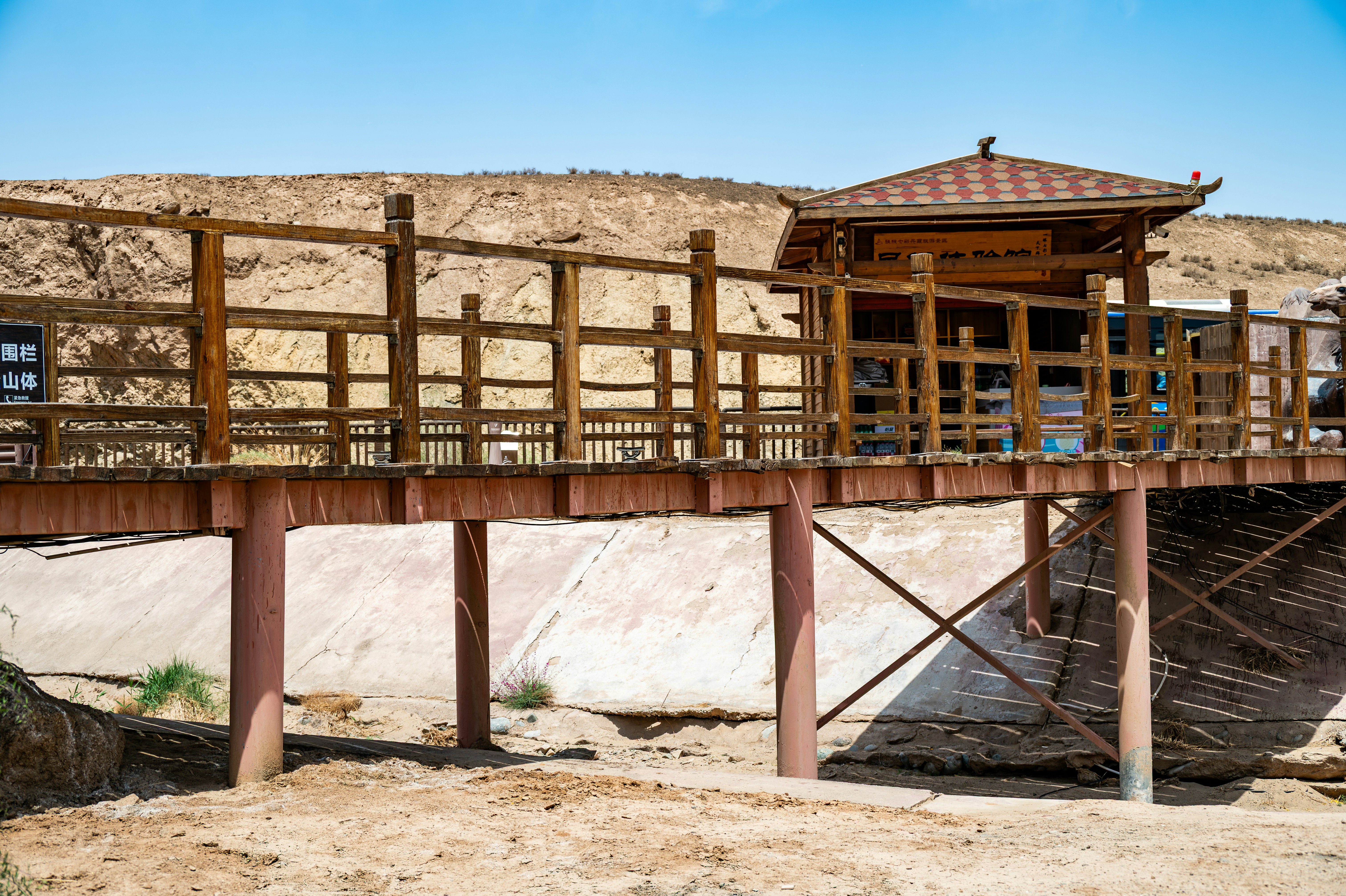 Bridge Across the Dunes: The Quiet Pavilion at the End of the Walkway