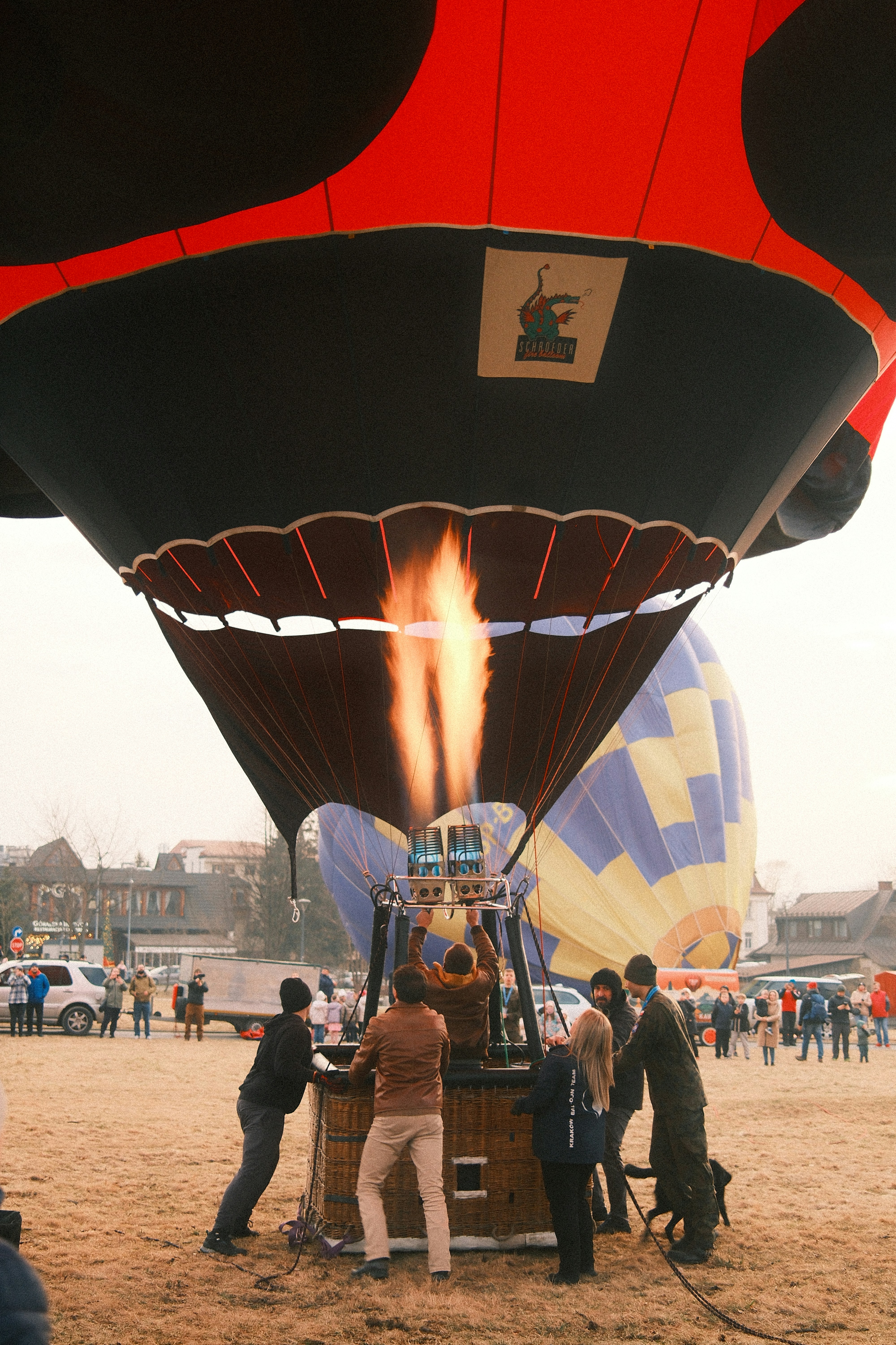 Pulse of the Lift: Ground Crew Manages the Flame at a Balloon Launch