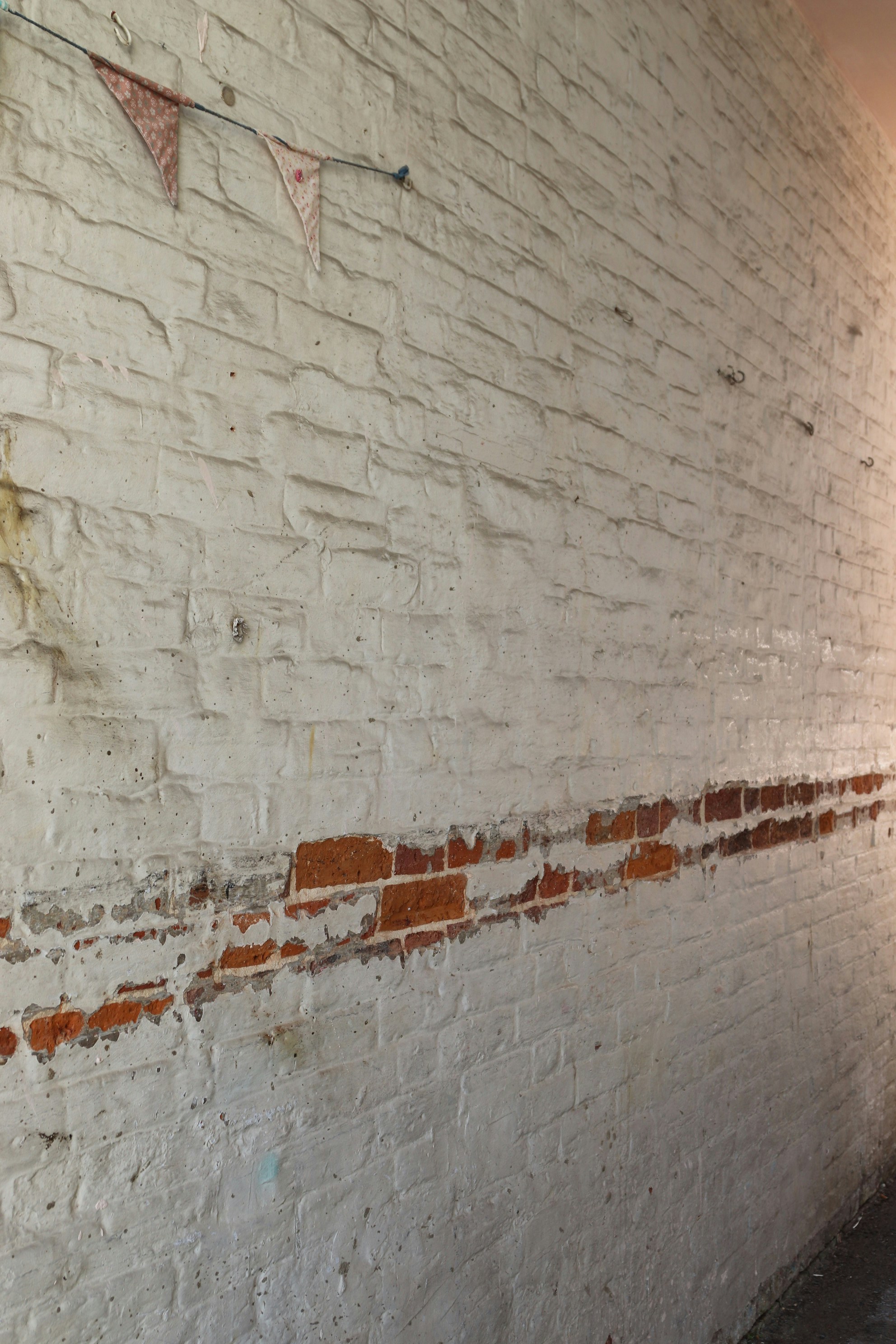 White brick wall with exposed brick details. photo – Free Texture Image ...