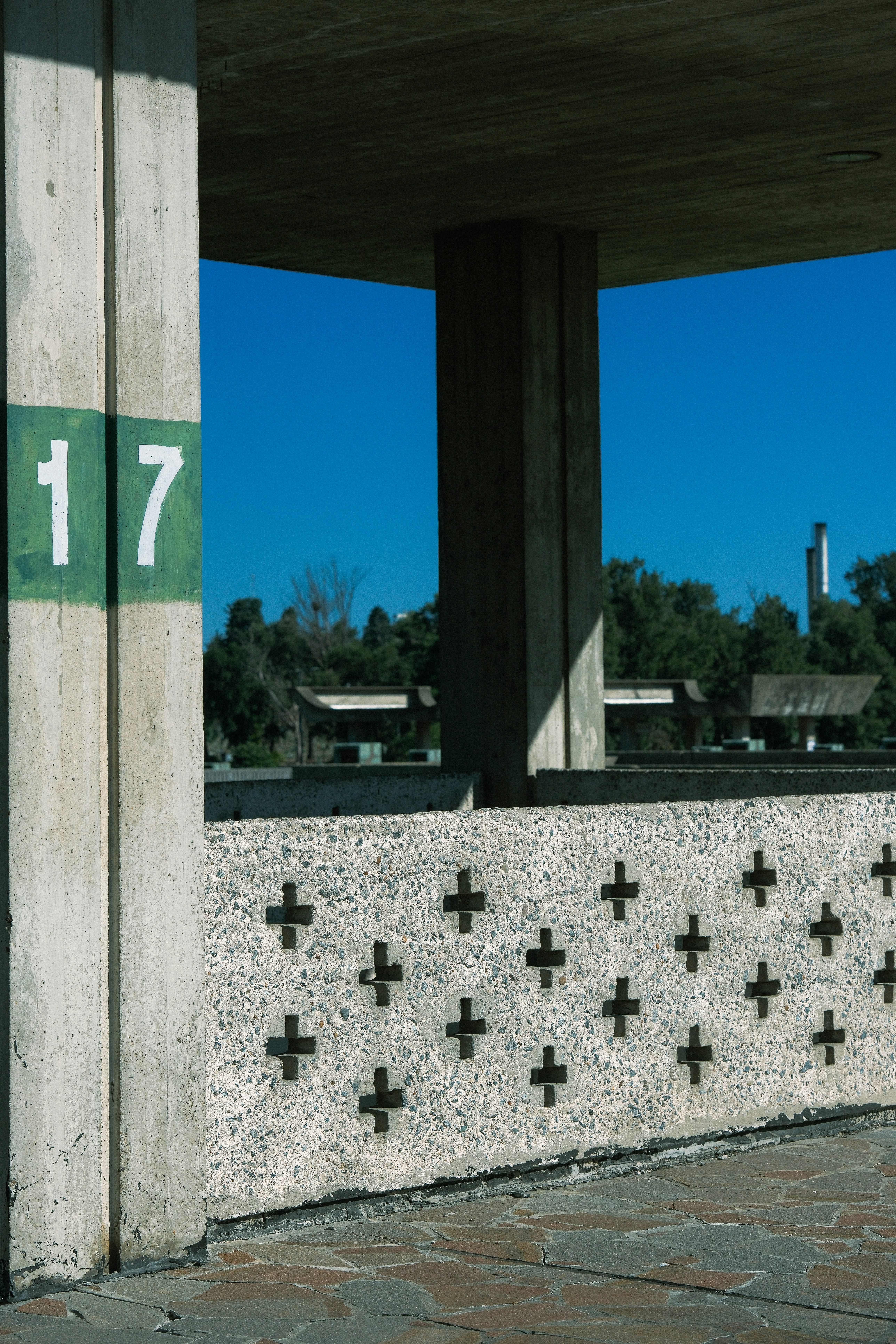 Seventeen Mark on Sunlit Concrete: Geometry of Columns and Crosses