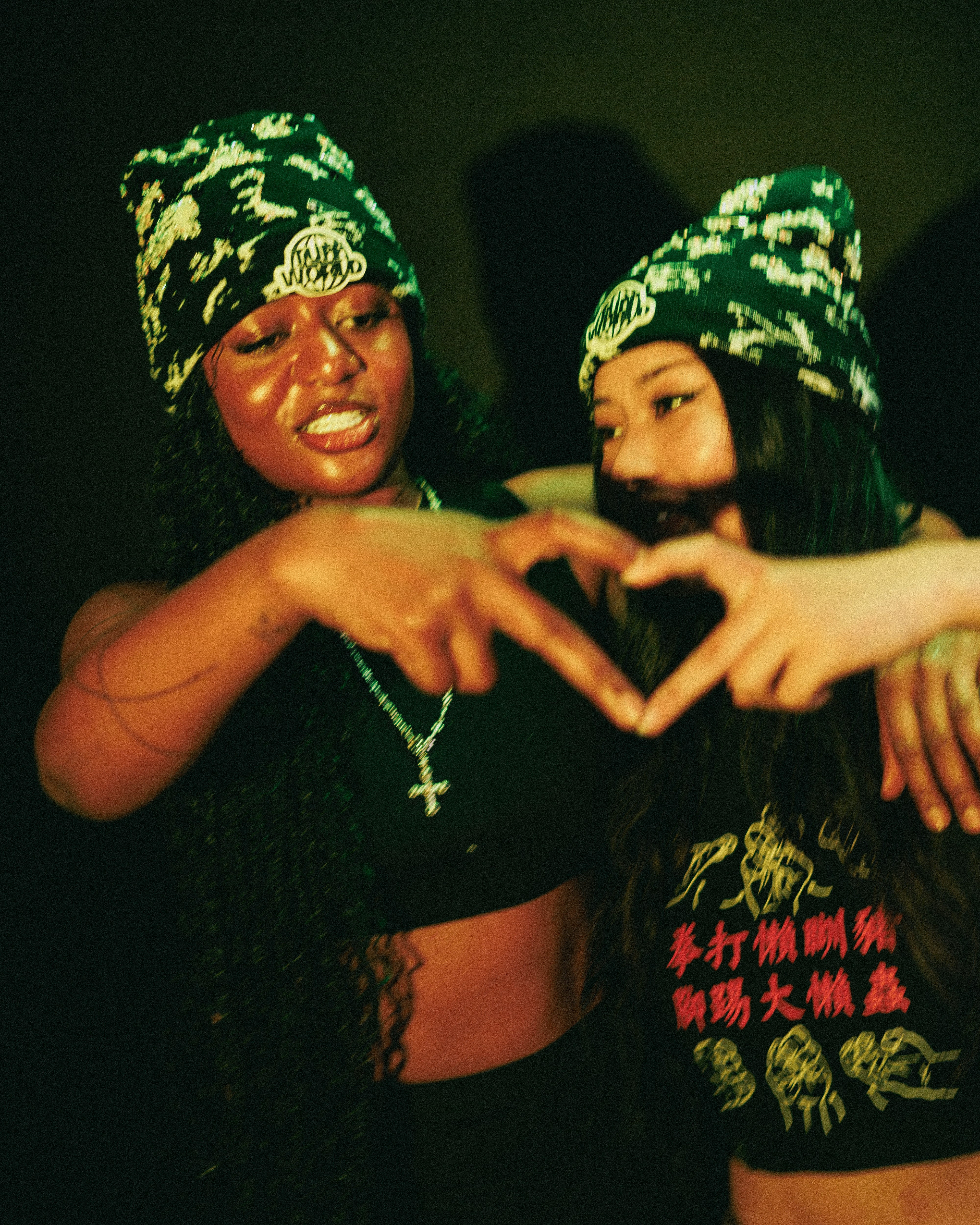 Two women are showing love with their hands. photo – Free Woman Image ...