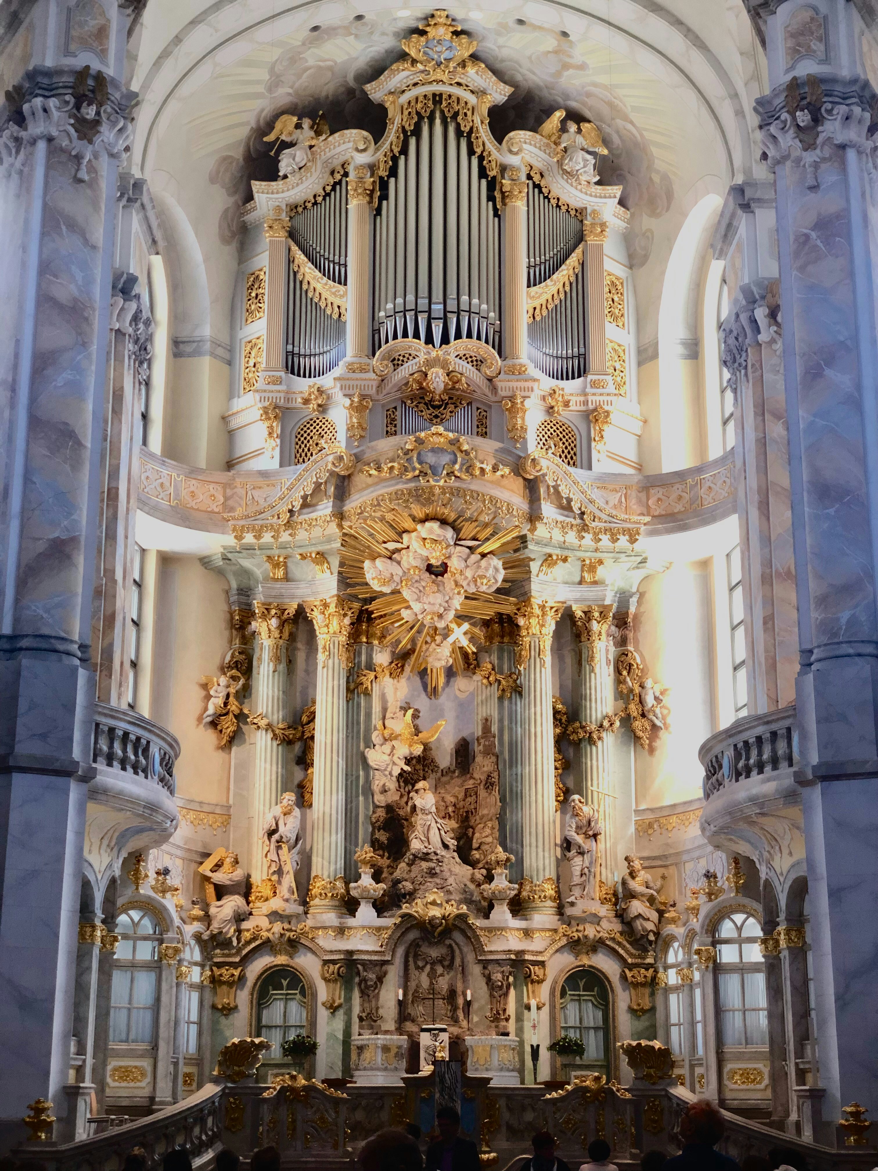 A magnificent organ and intricate architecture are showcased. photo ...