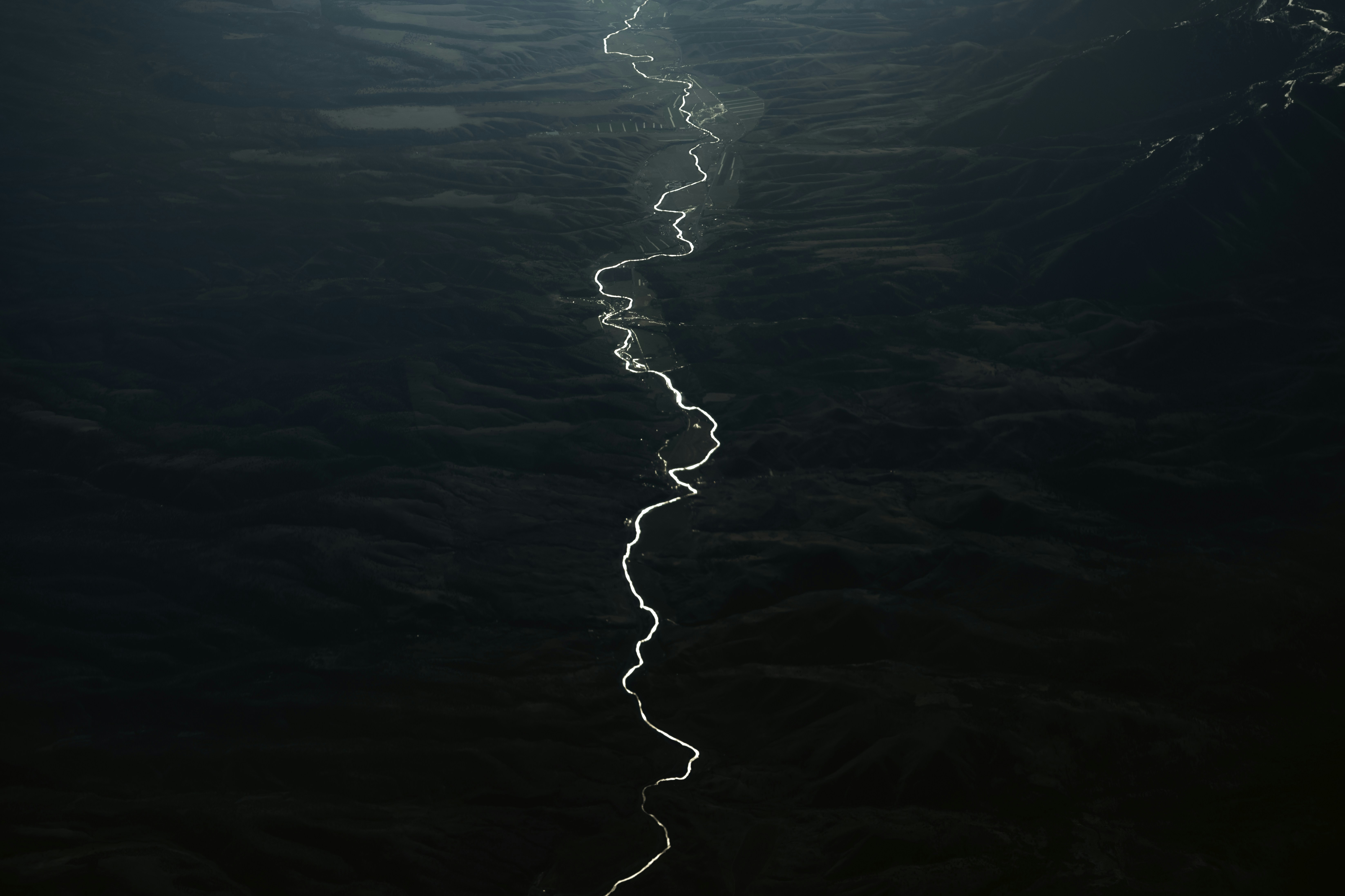 A winding river flows through the landscape.