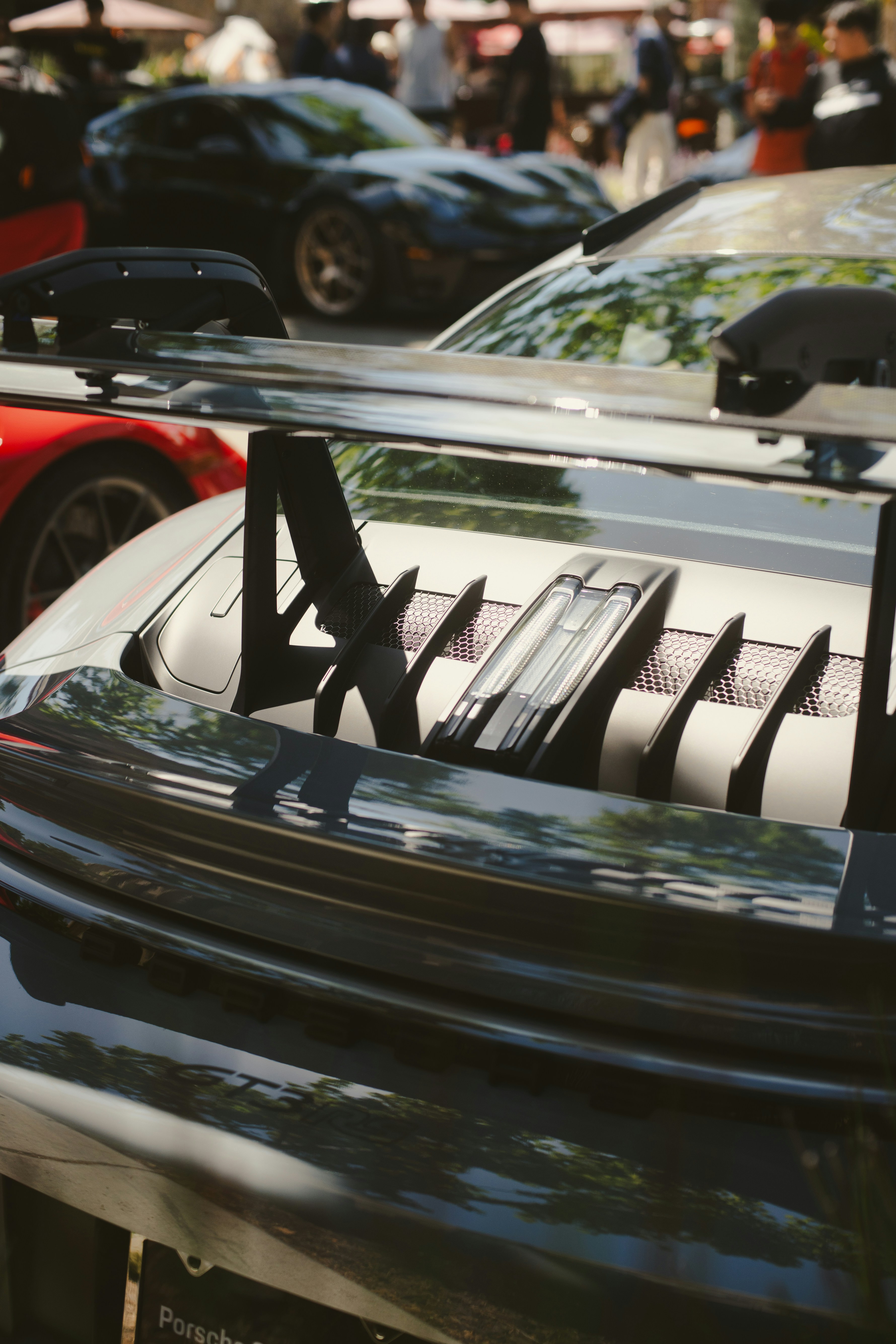 Racing Reflux: The Rear Wing and Vents of a Glossy Street Car