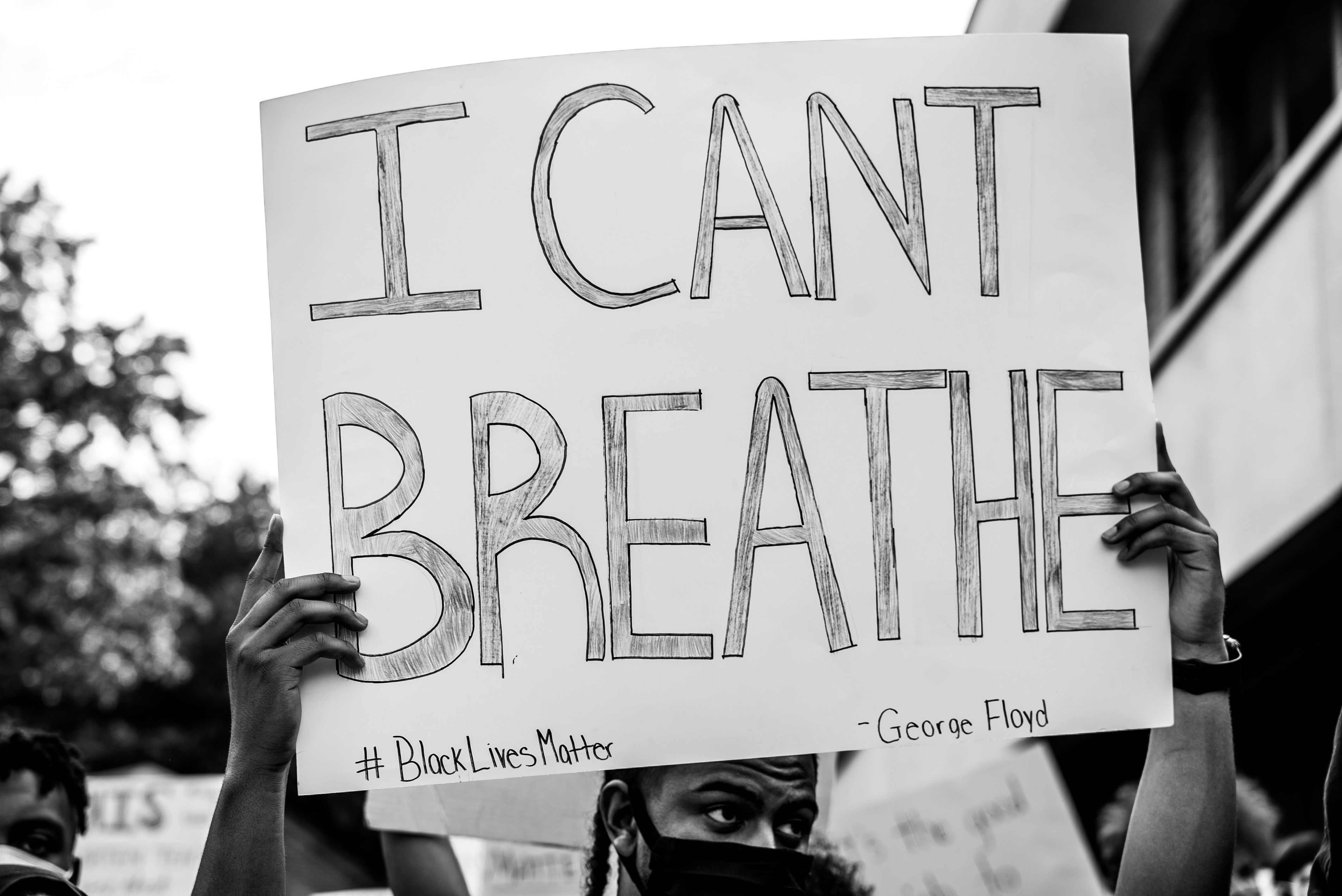 Ink and Iron Resolve: 'I CAN'T BREATHE' Sign at a Black Lives Matter Rally