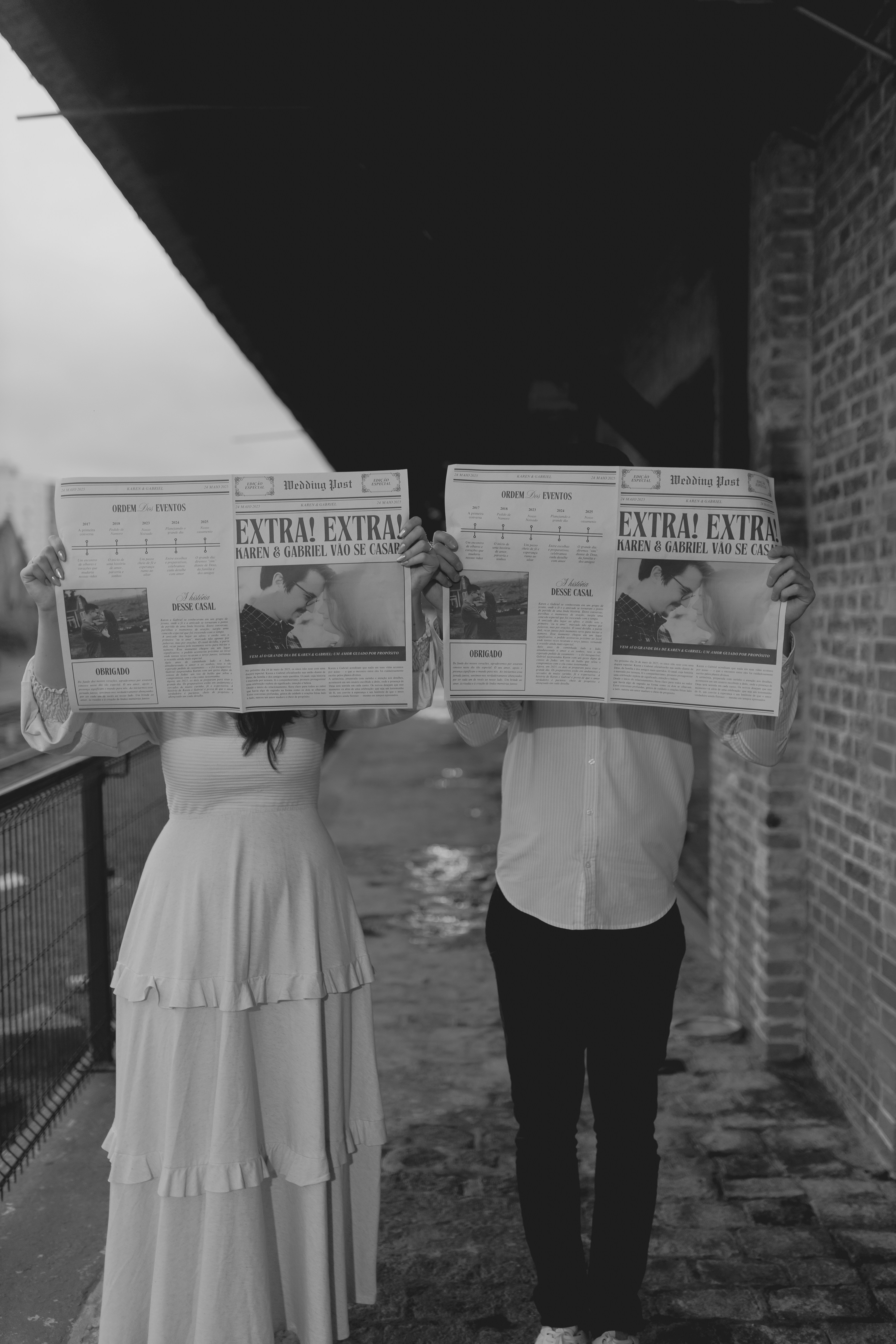 Couple holds newspapers to celebrate their relationship. photo – Free ...