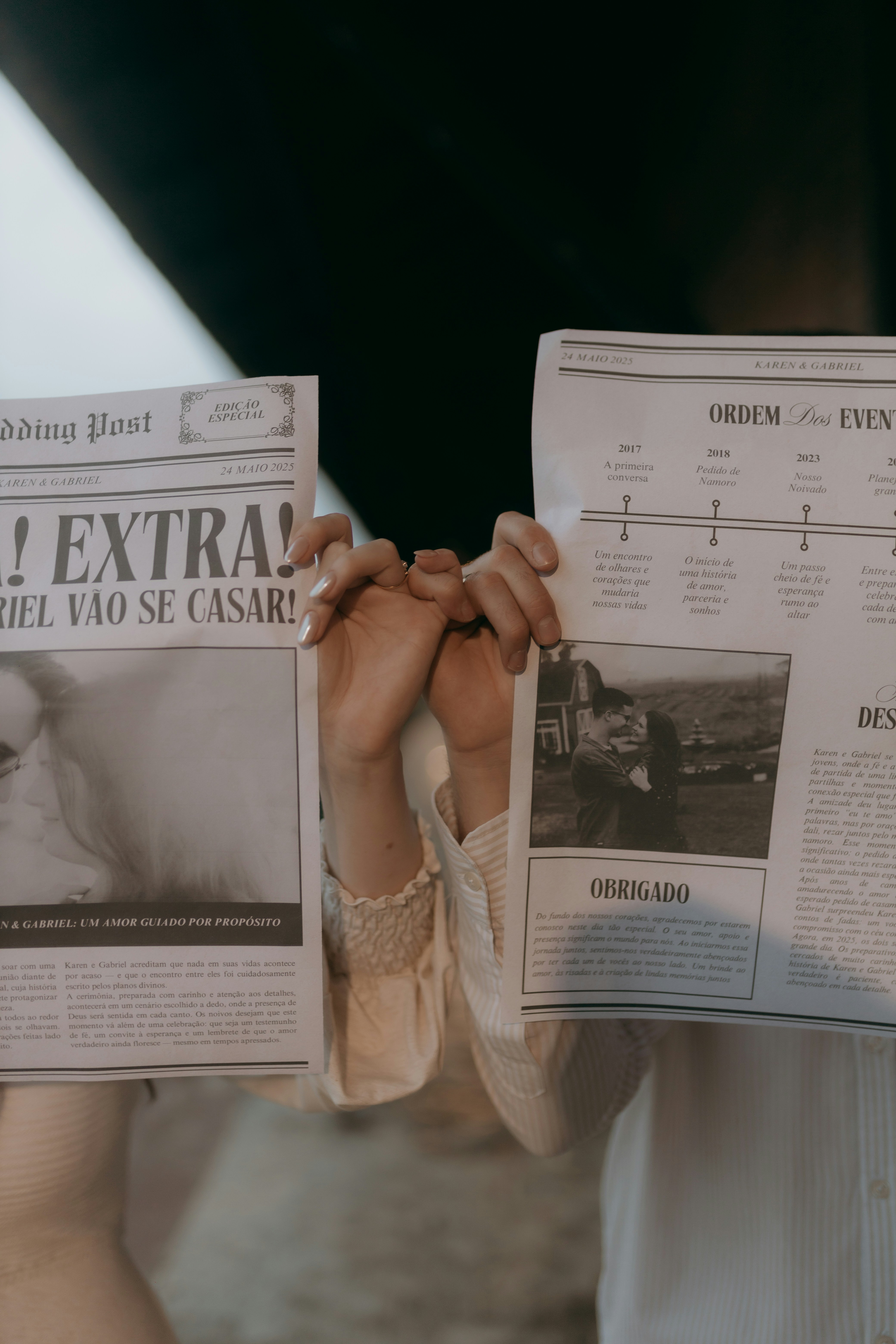 Hands hold up newspapers with wedding announcements. photo – Free Human ...