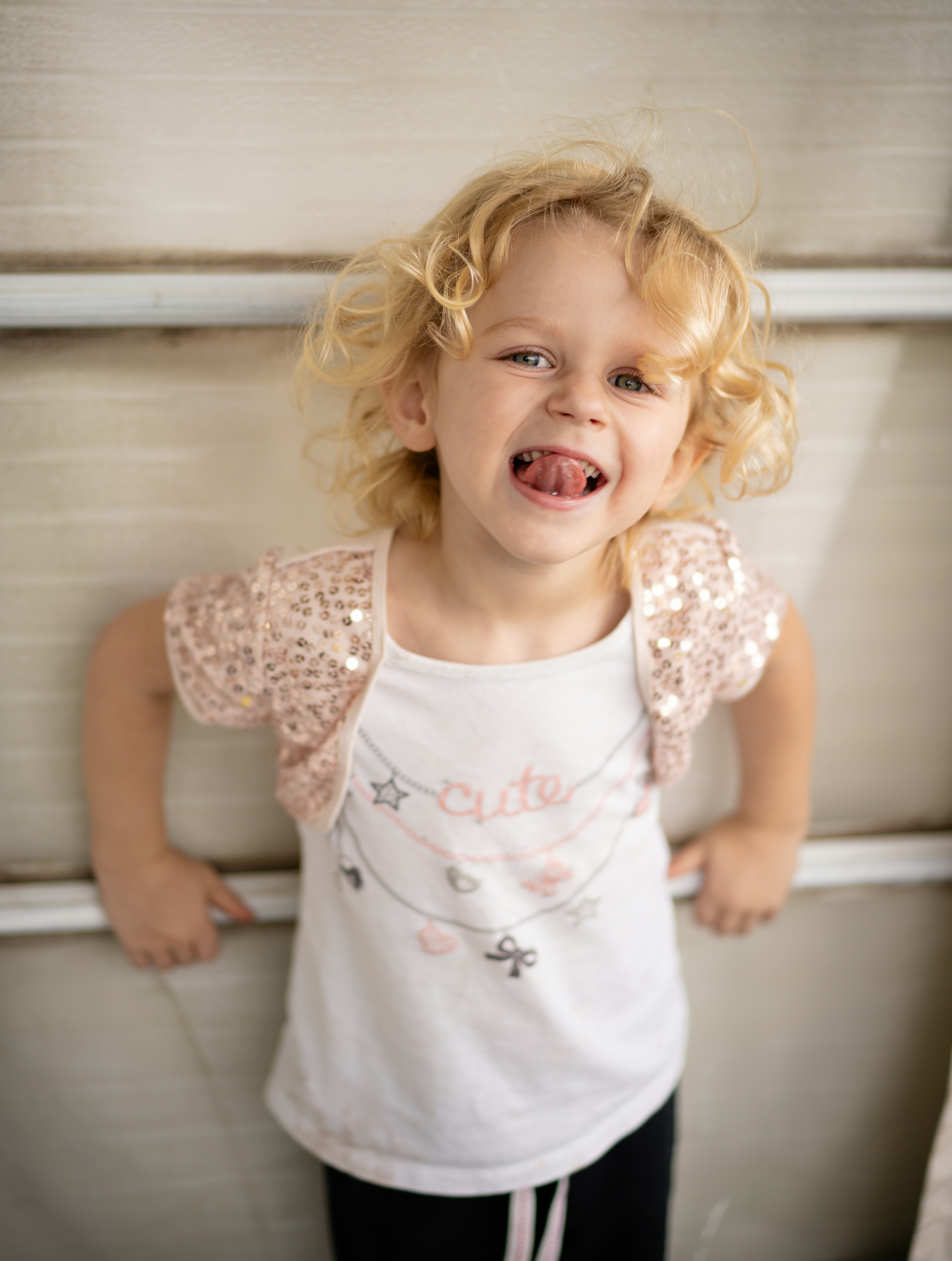 A child poses with a silly, cheerful face. photo – Free Portrait Image ...
