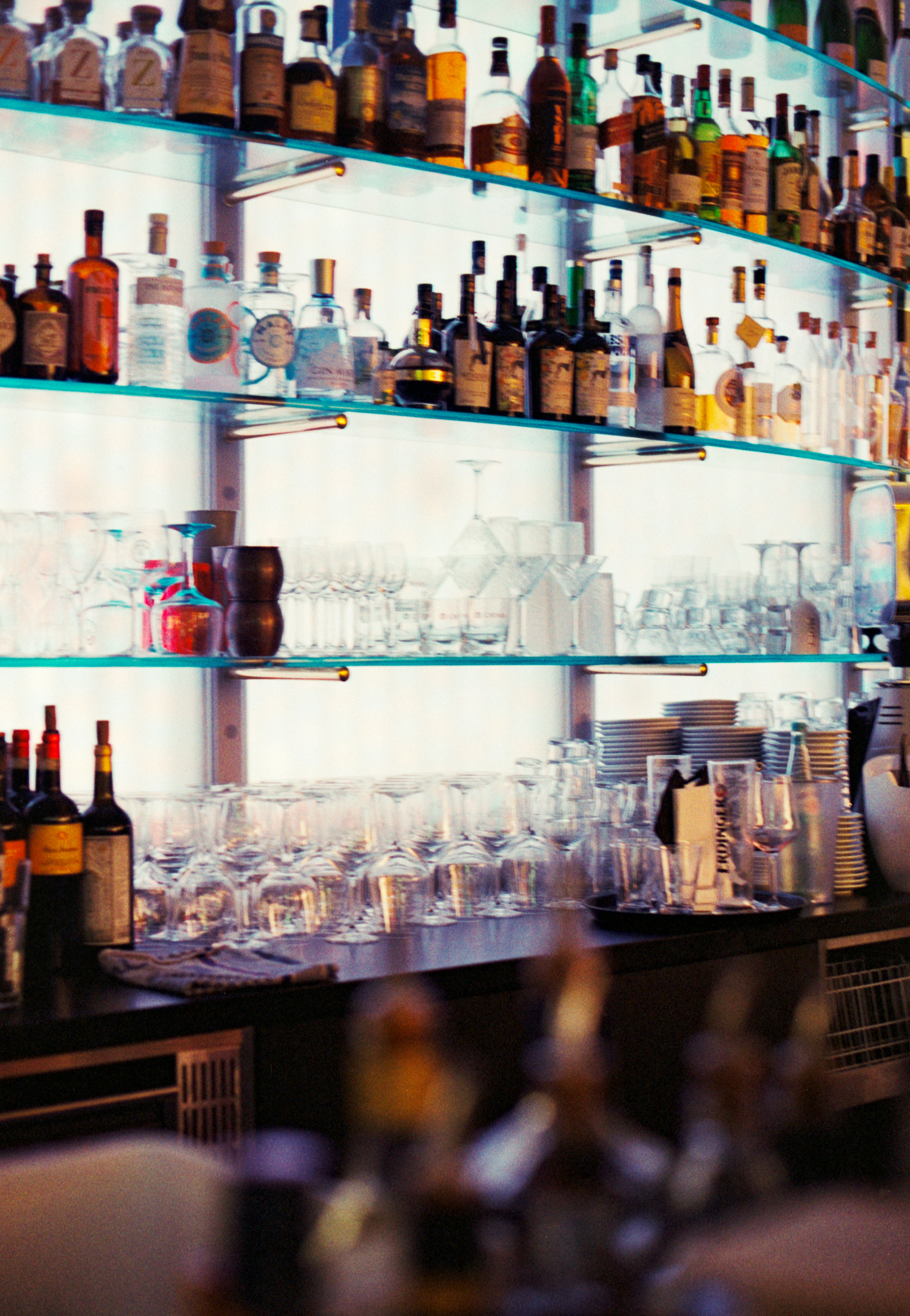 Shelves display a wide array of alcohol bottles. photo – Free Film ...